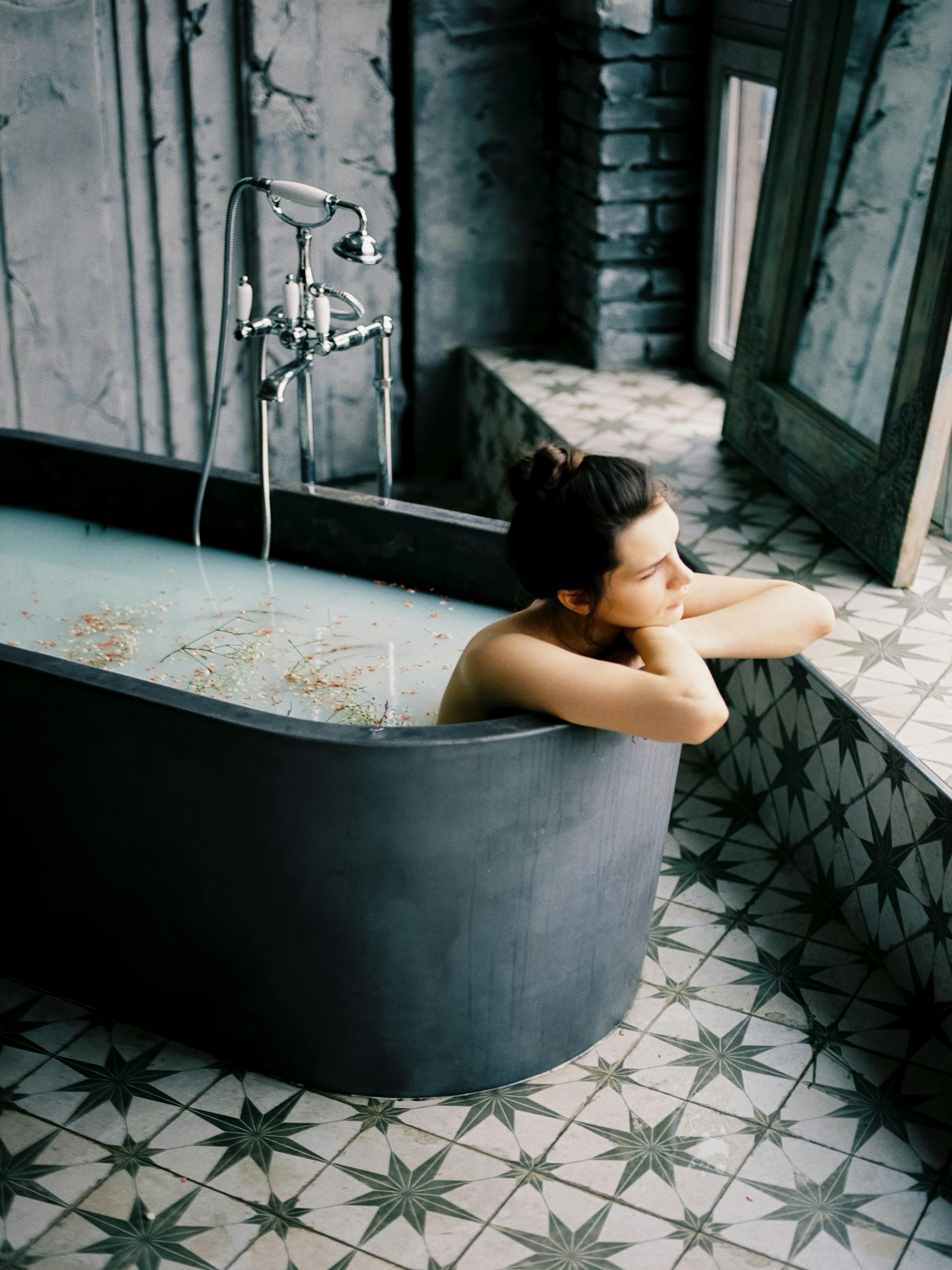 Woman Sitting in Bathtub · Free Stock Photo
