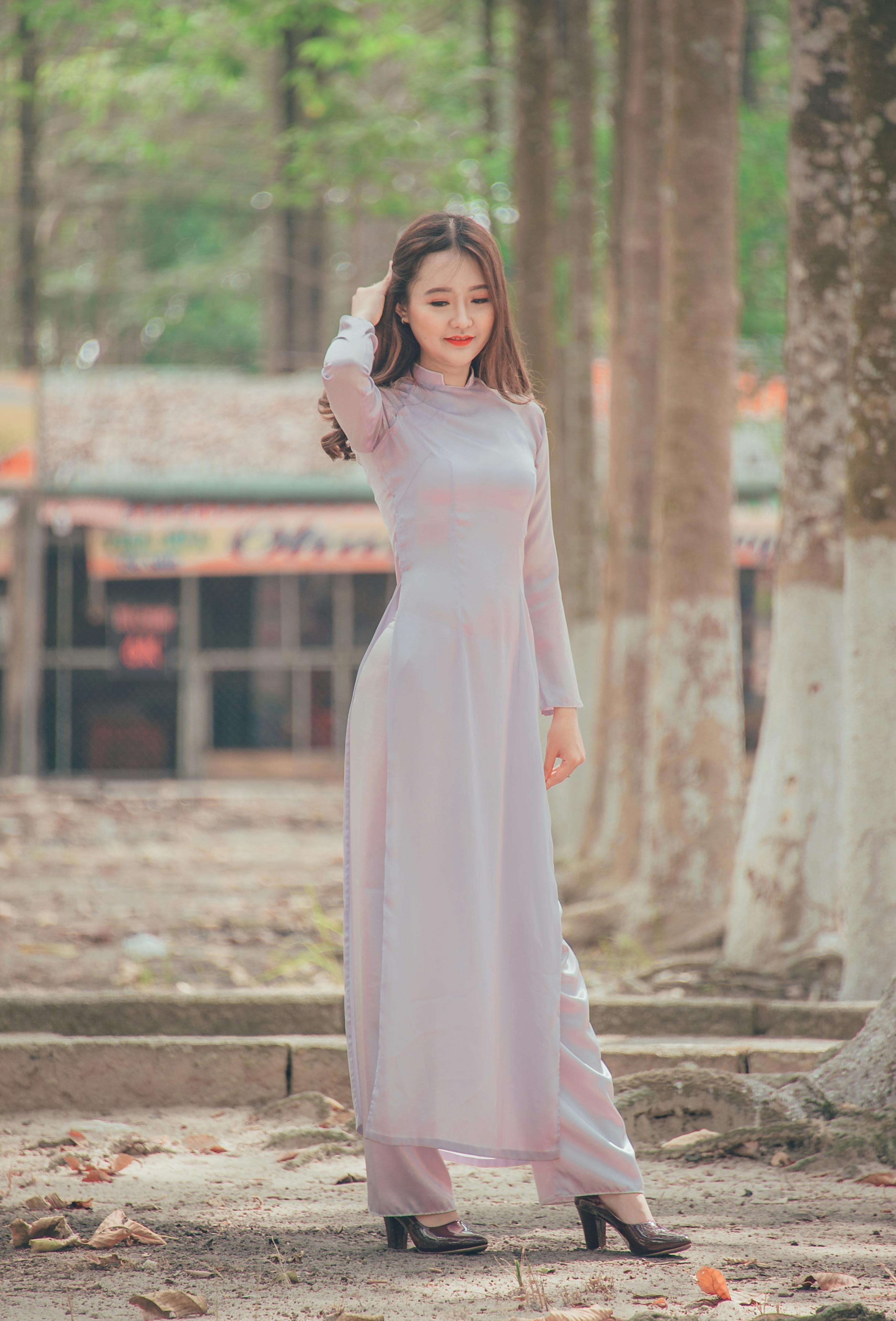 Photo of Woman Wearing Long Dress · Free Stock Photo