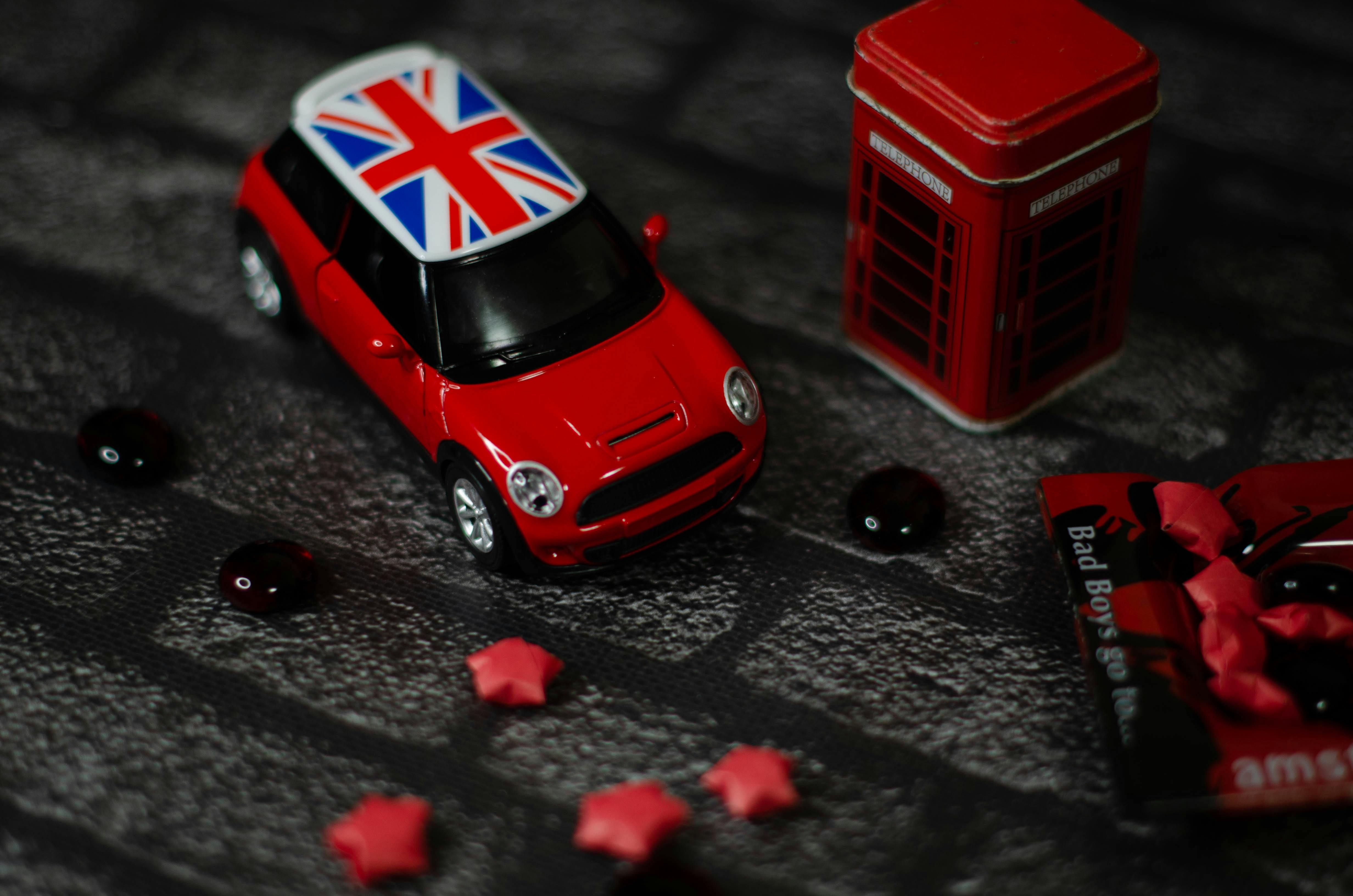 Close-Up Shot of Red Miniature Toys · Free Stock Photo