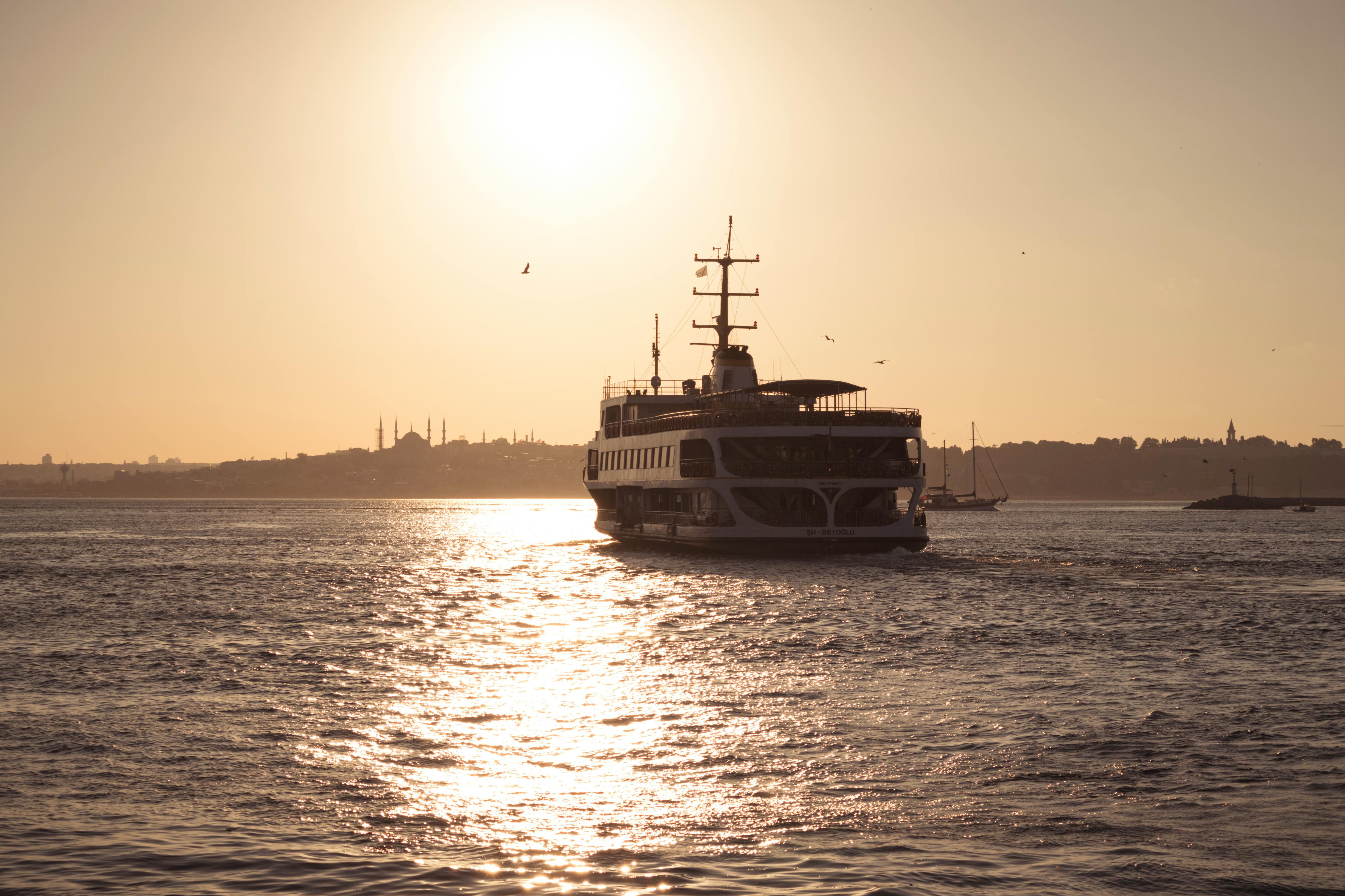 Top View of a Woman Leaning Overboard on a Ship · Free Stock Photo