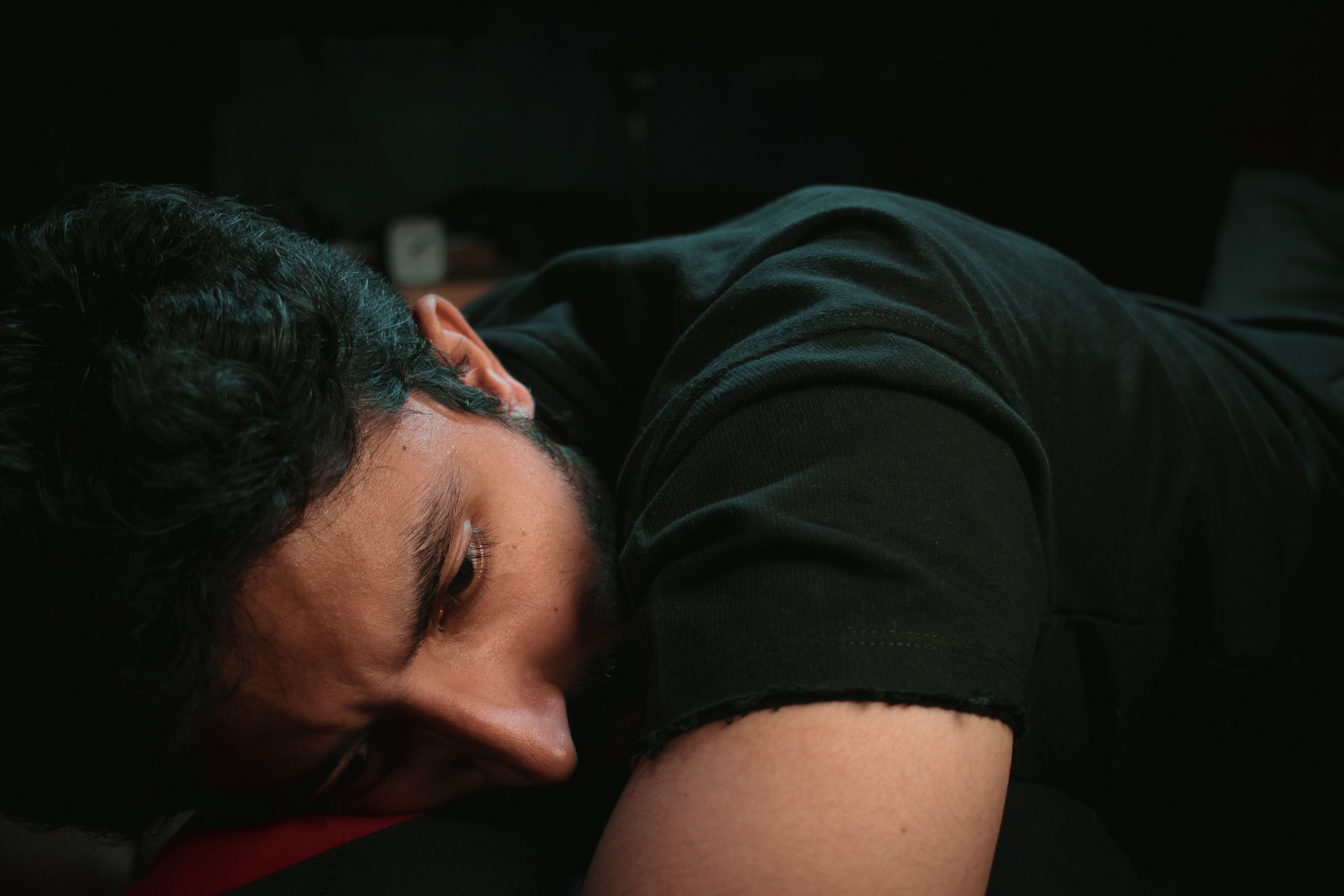 Close-Up Shot of a Man Lying Down · Free Stock Photo