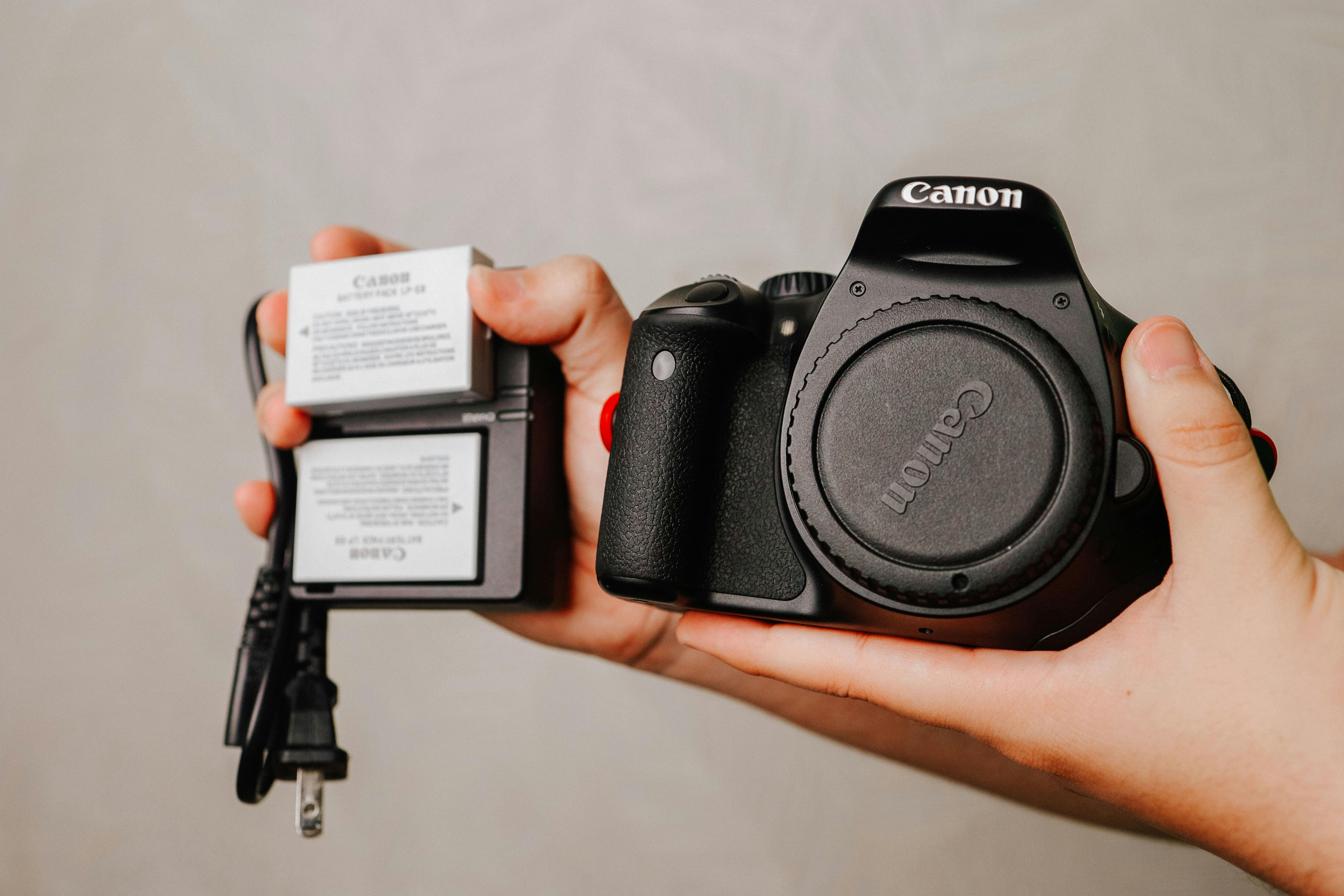 Canon Dslr Camera On Table · Free Stock Photo