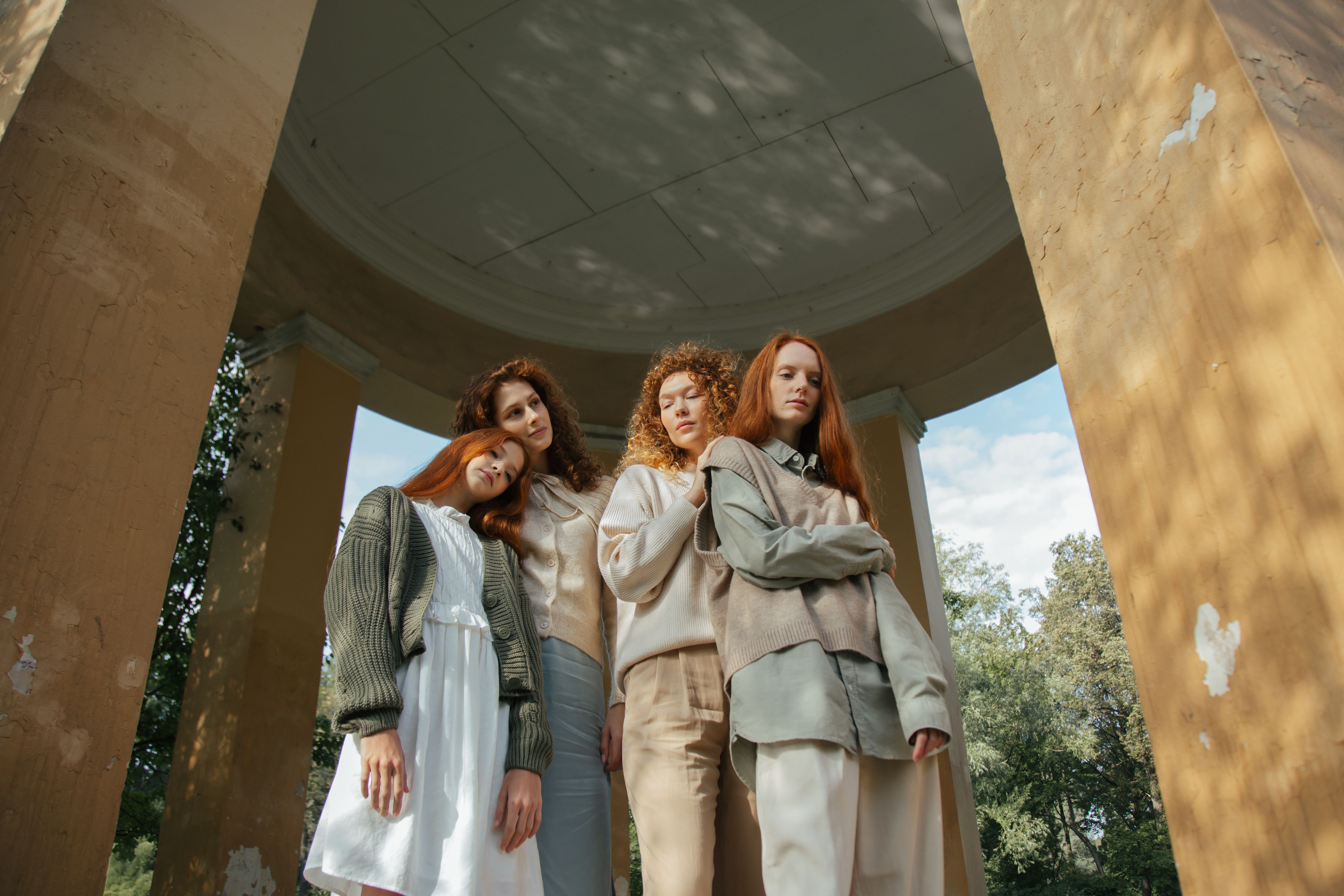 Portrait of Four Female Friends Standing Together · Free Stock Photo