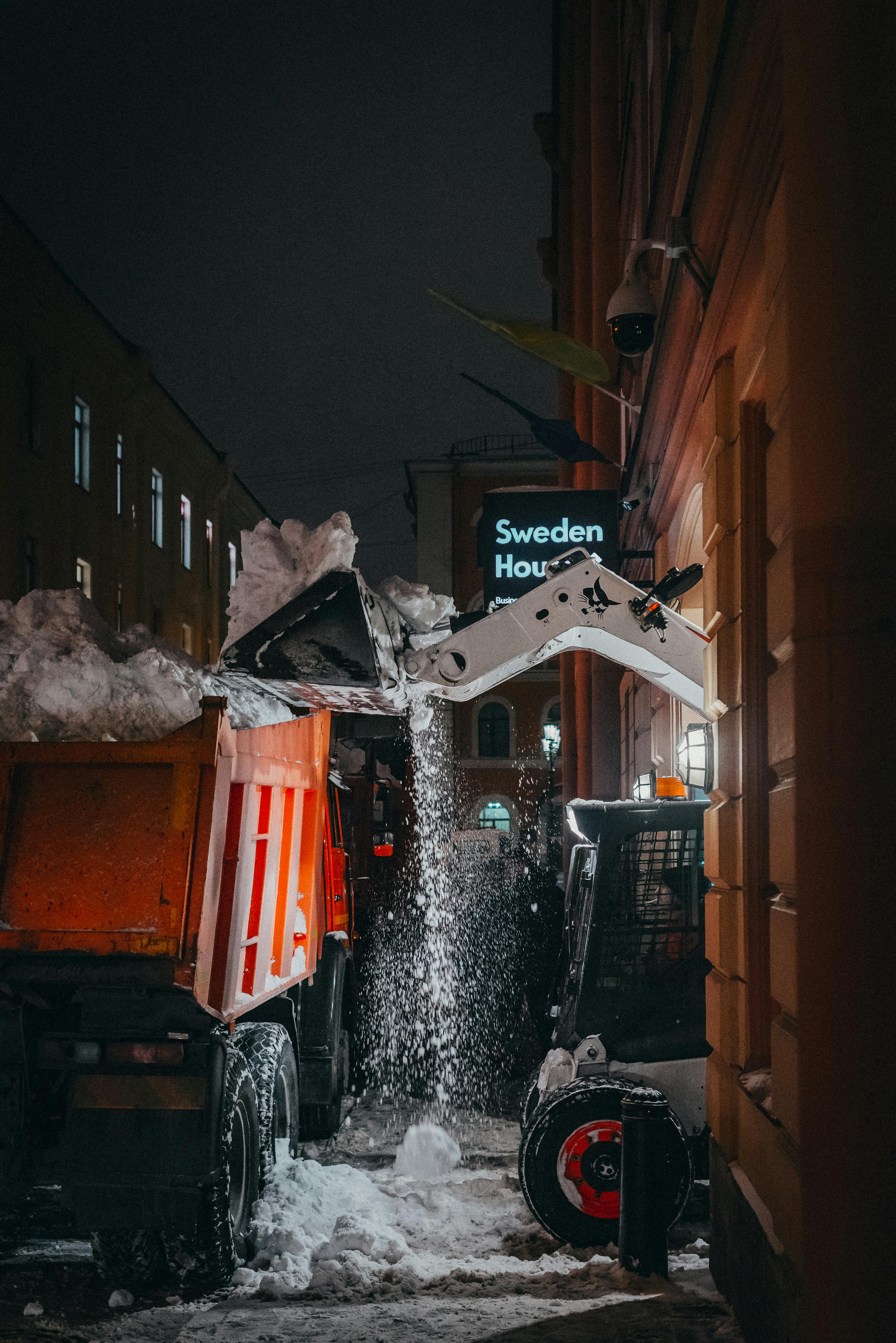 Loading Snow on Truck · Free Stock Photo