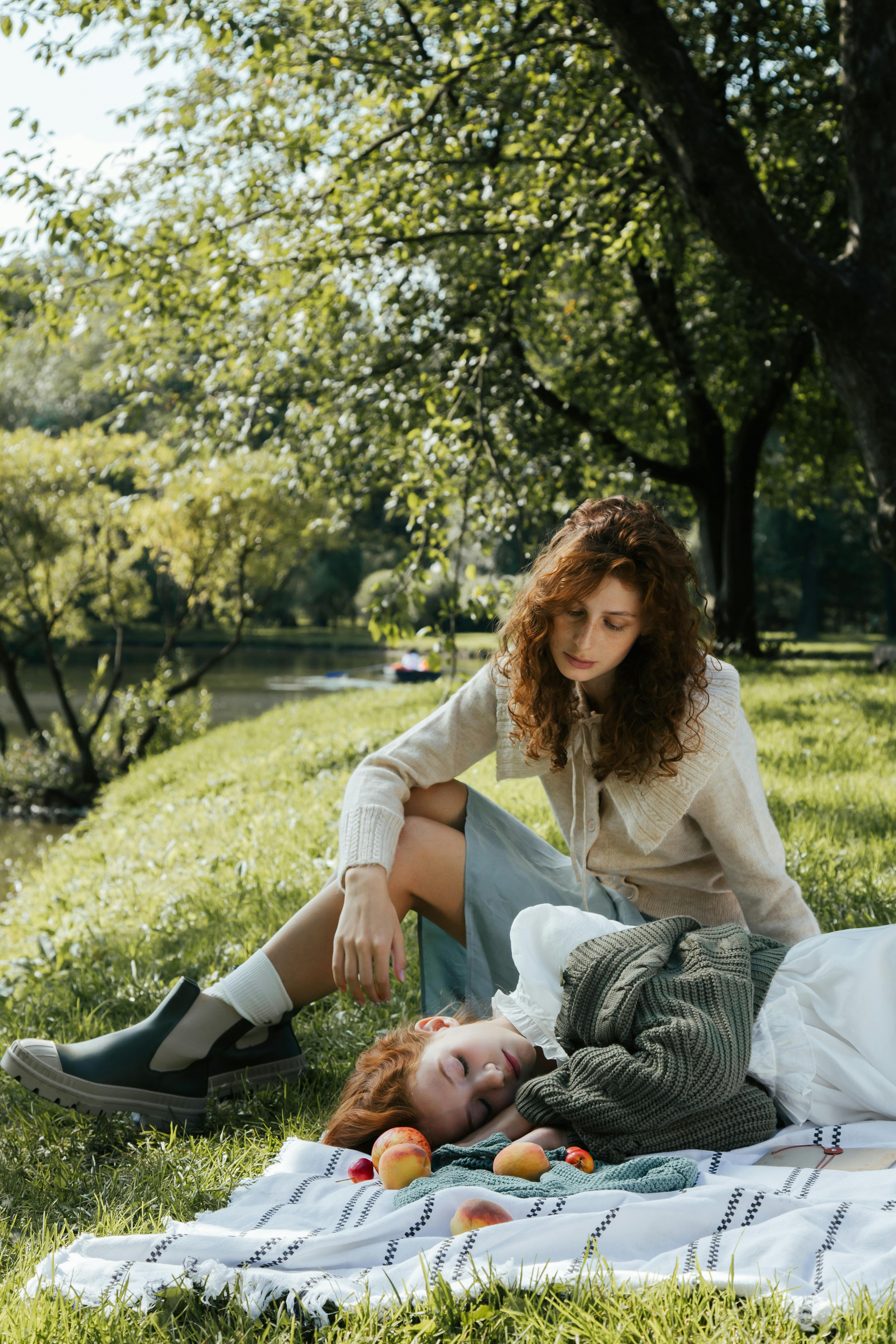 Women Sitting on Grass in Park · Free Stock Photo