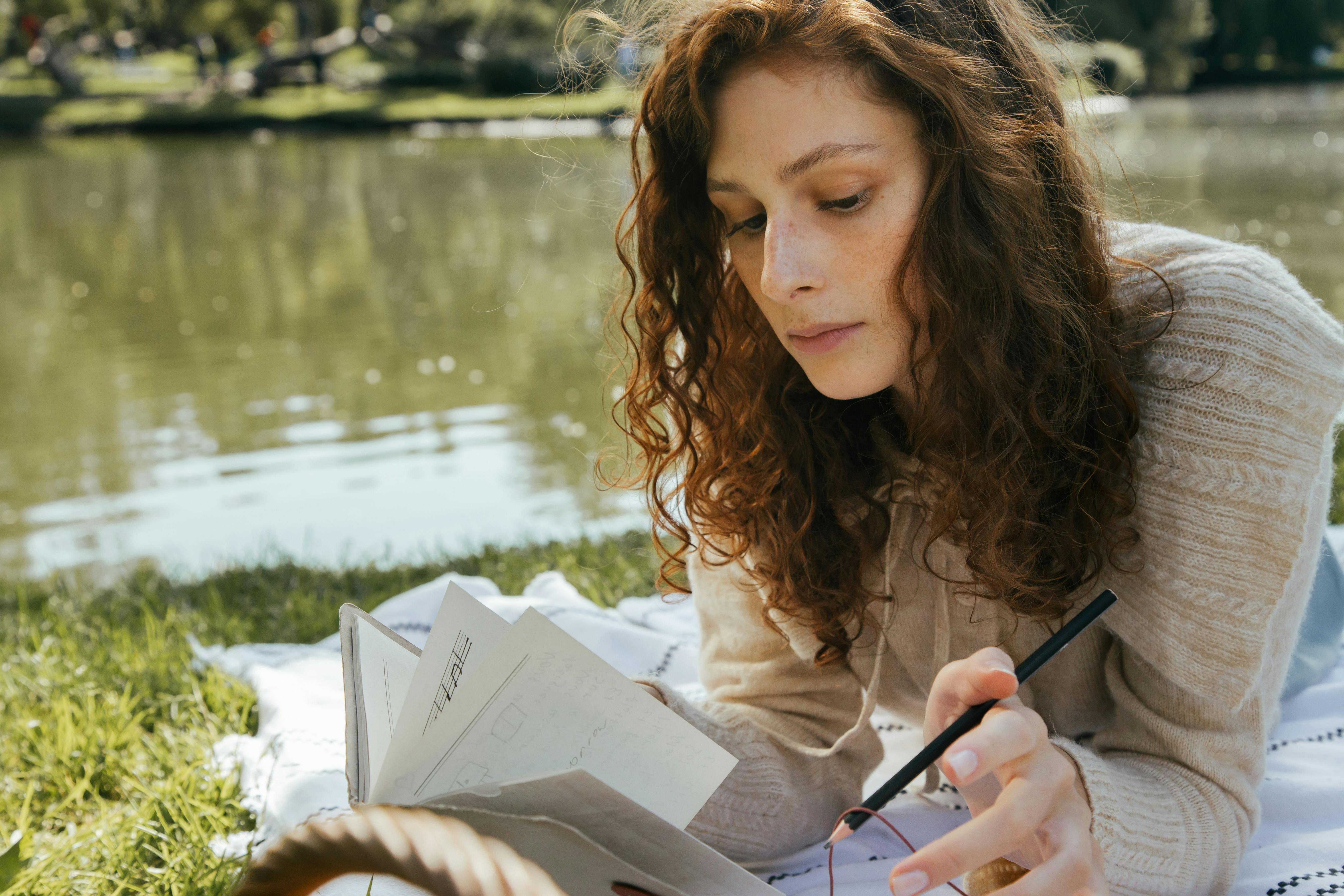 Woman Writing in Journal · Free Stock Photo