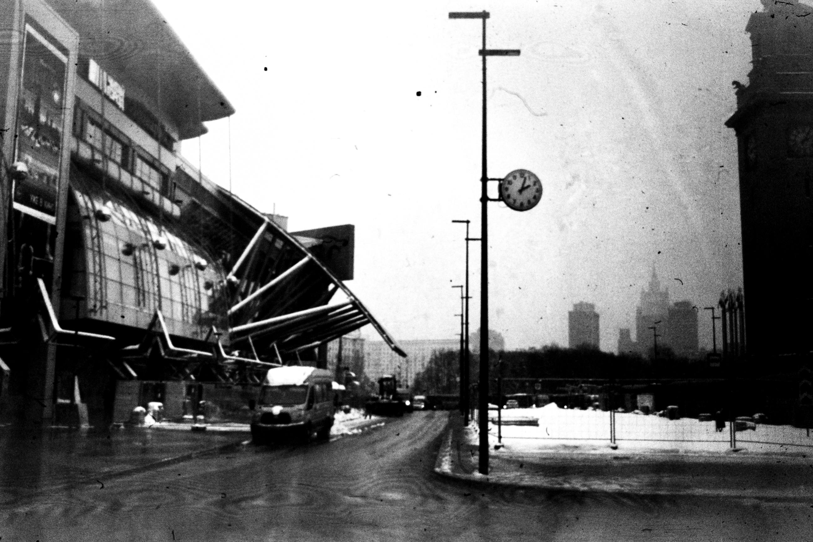 Moving Vintage Cars on the Road Near Old Concrete Buildings · Free ...