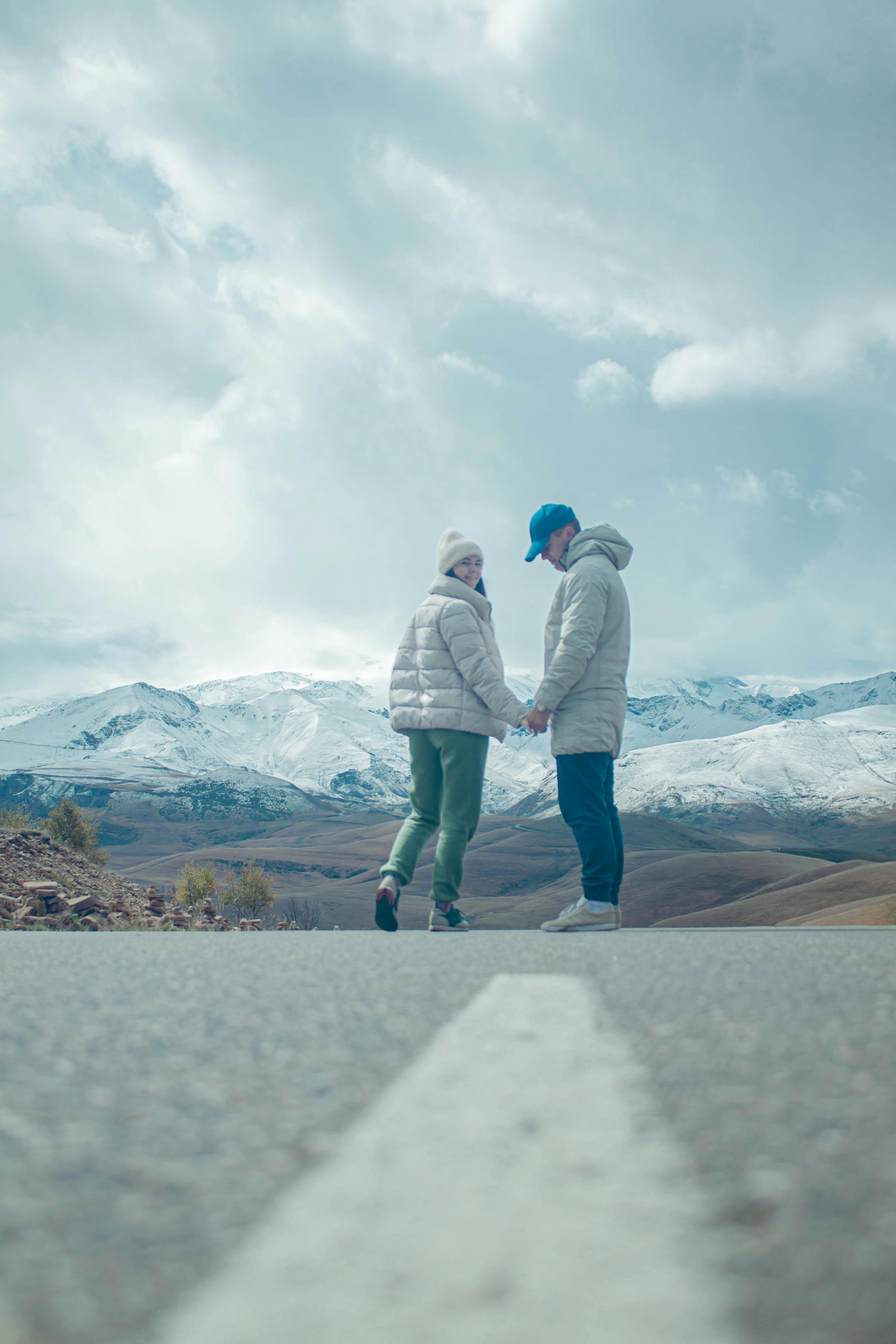 Couple Standing on Road · Free Stock Photo