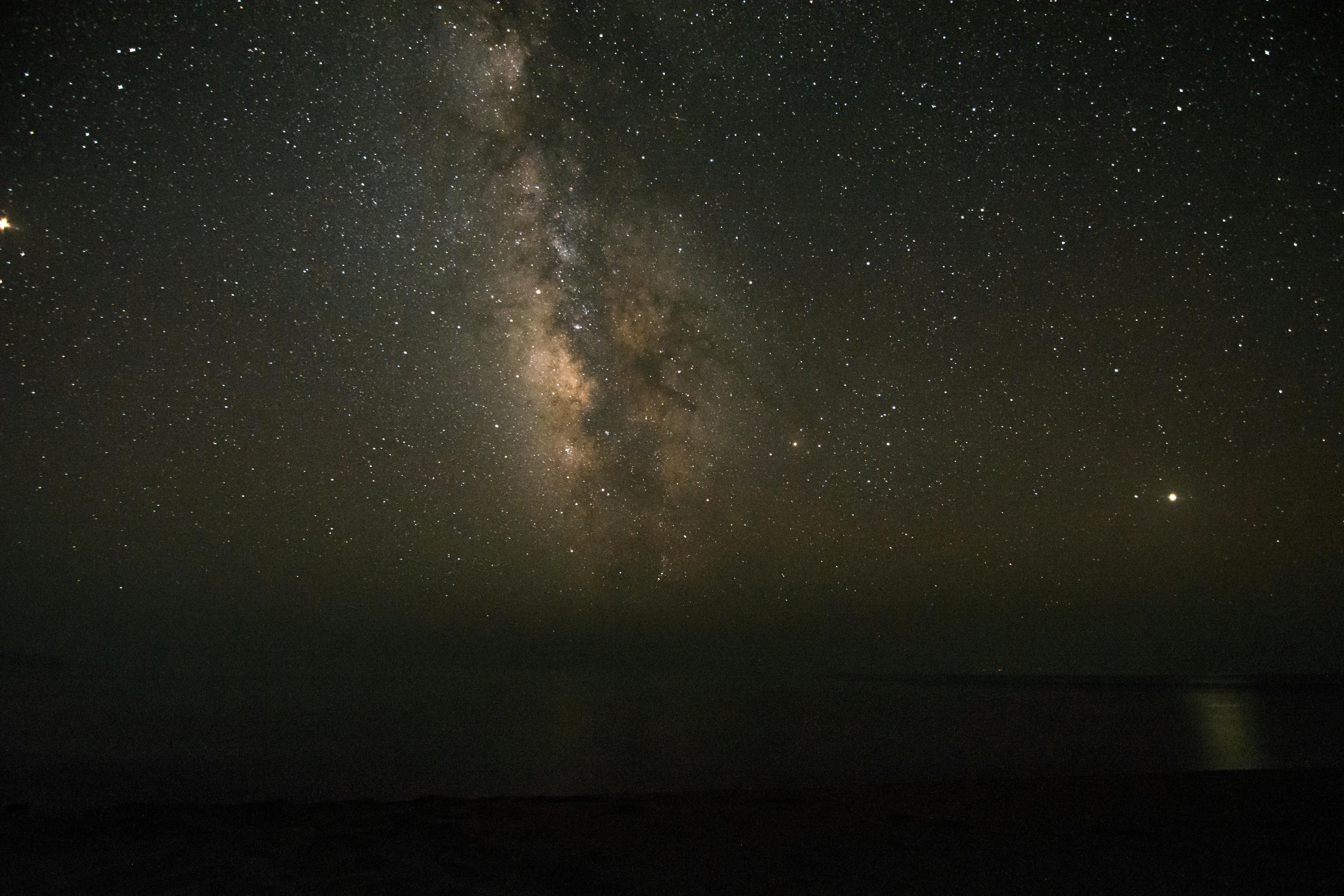 A View of the Beautiful Starry Night over the Sea · Free Stock Photo