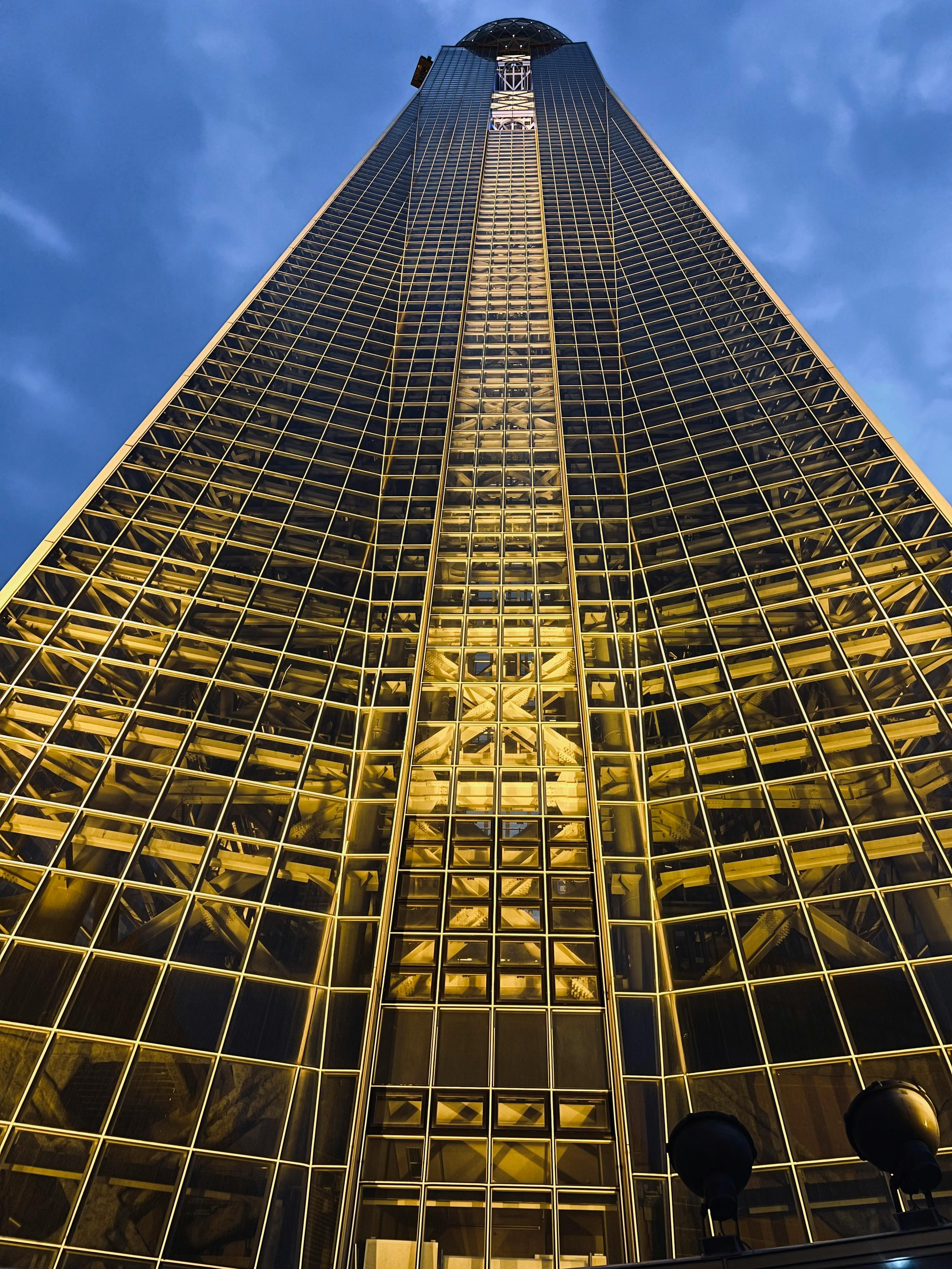 Low Angle Photography of Glass Building Under Blue Sky · Free Stock Photo