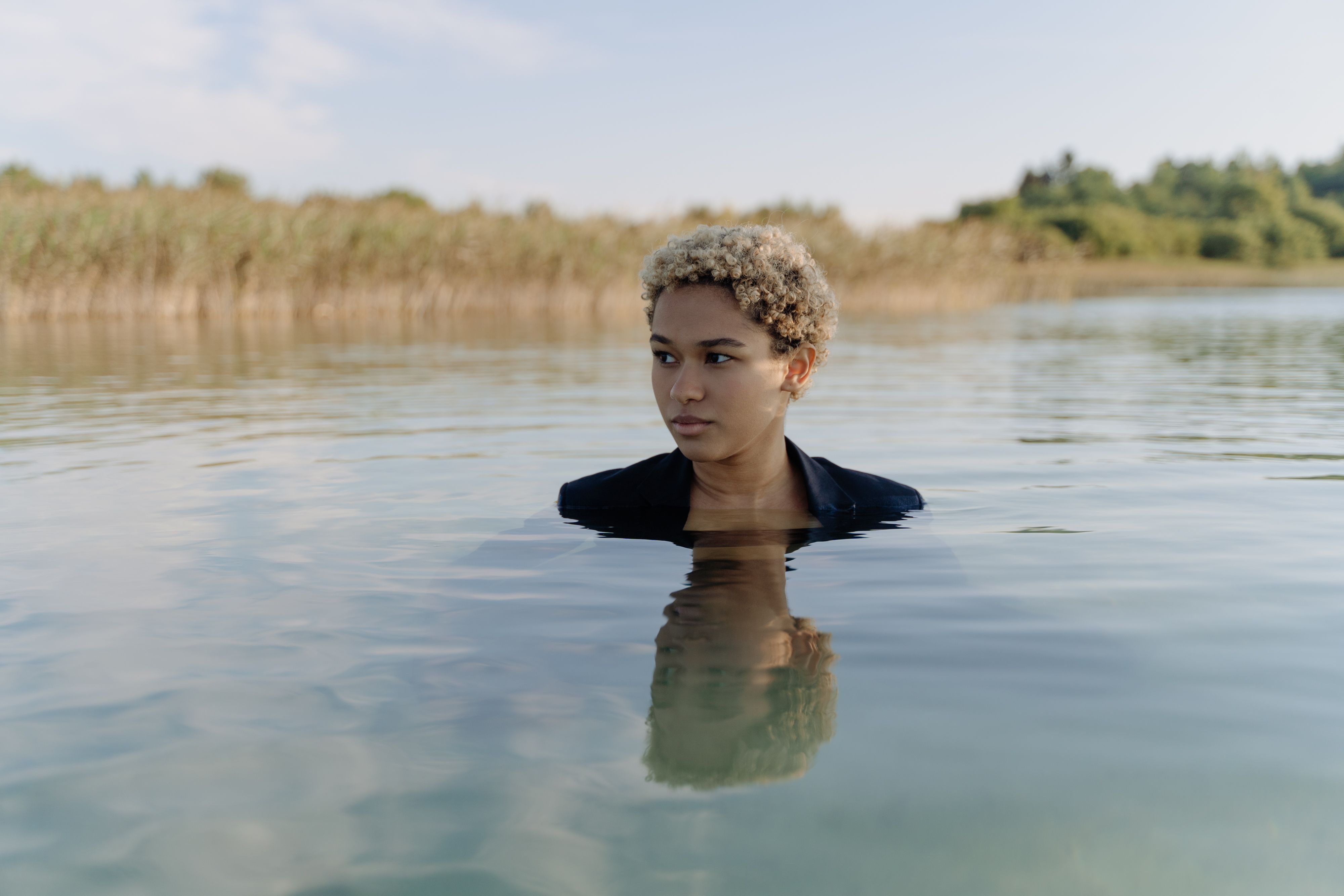 Reflection of Woman on Glass · Free Stock Photo