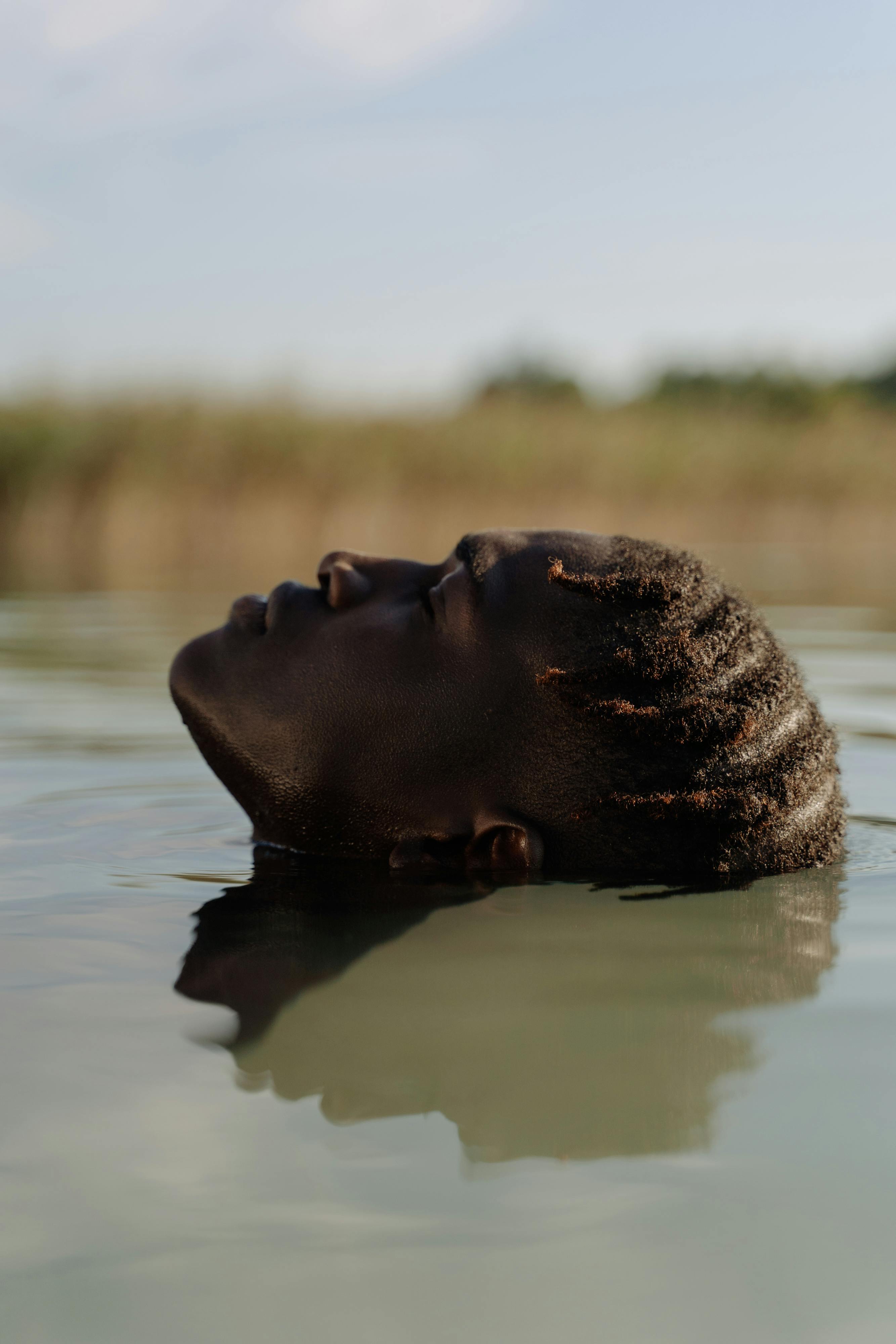 Man in White Bathrobe Washing His Face · Free Stock Photo