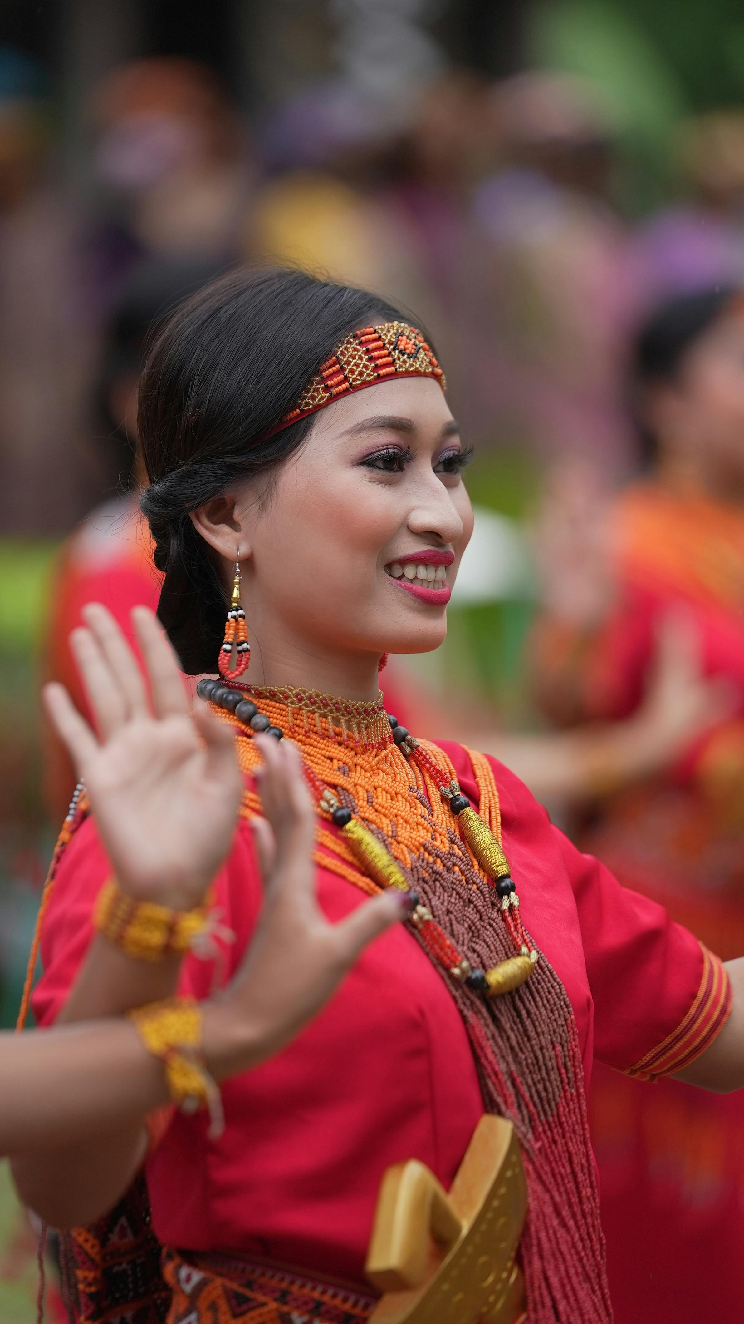 A Pretty Woman in a Red Traditional Clothing · Free Stock Photo