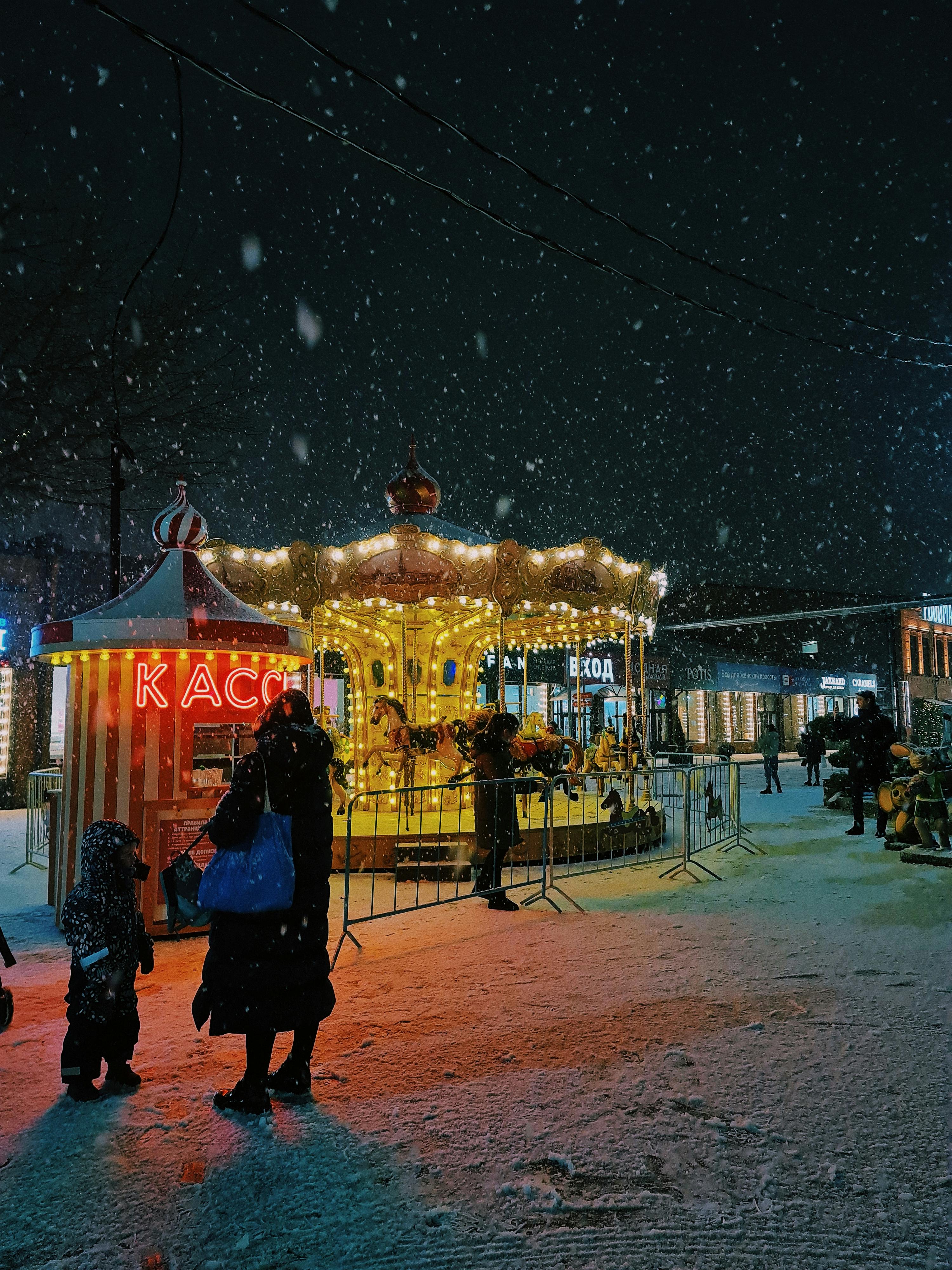 Illuminated Carousel on Winter Day · Free Stock Photo
