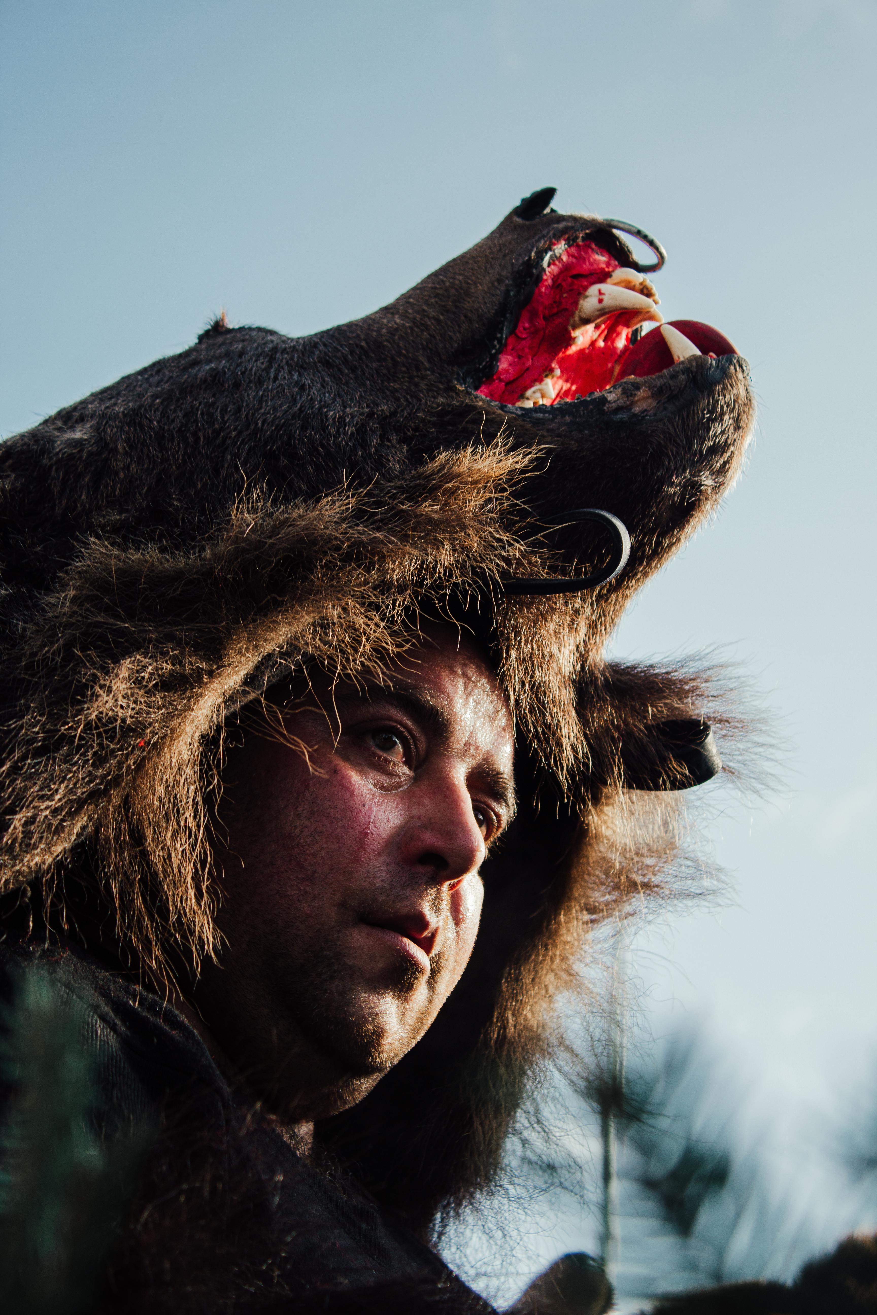 A Man Wearing Animal Headdress · Free Stock Photo