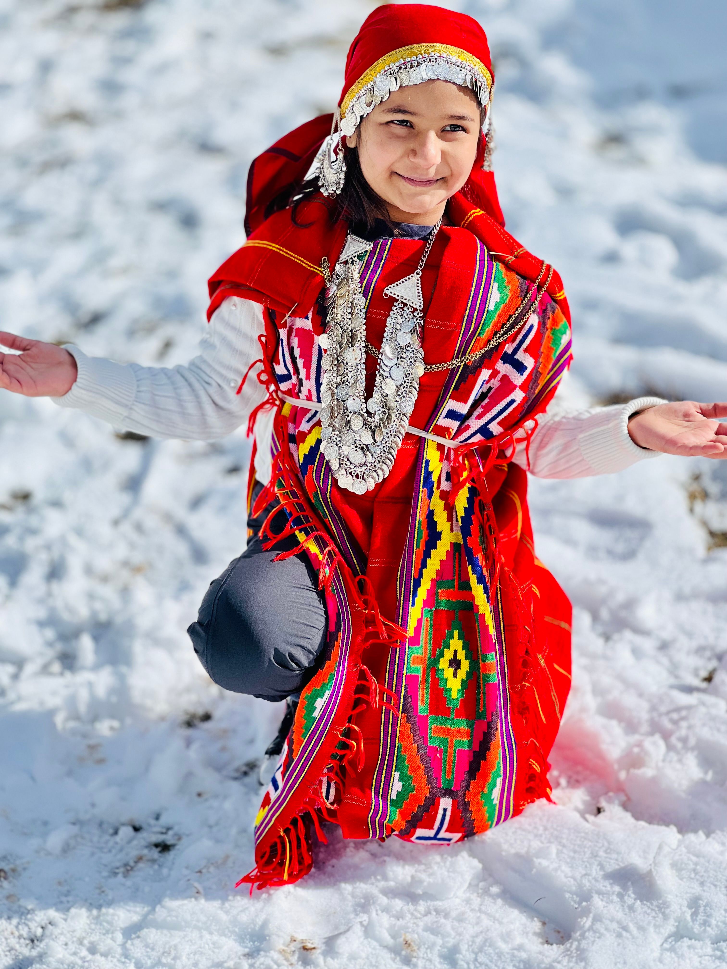 A Girl in Red Traditional Costume · Free Stock Photo