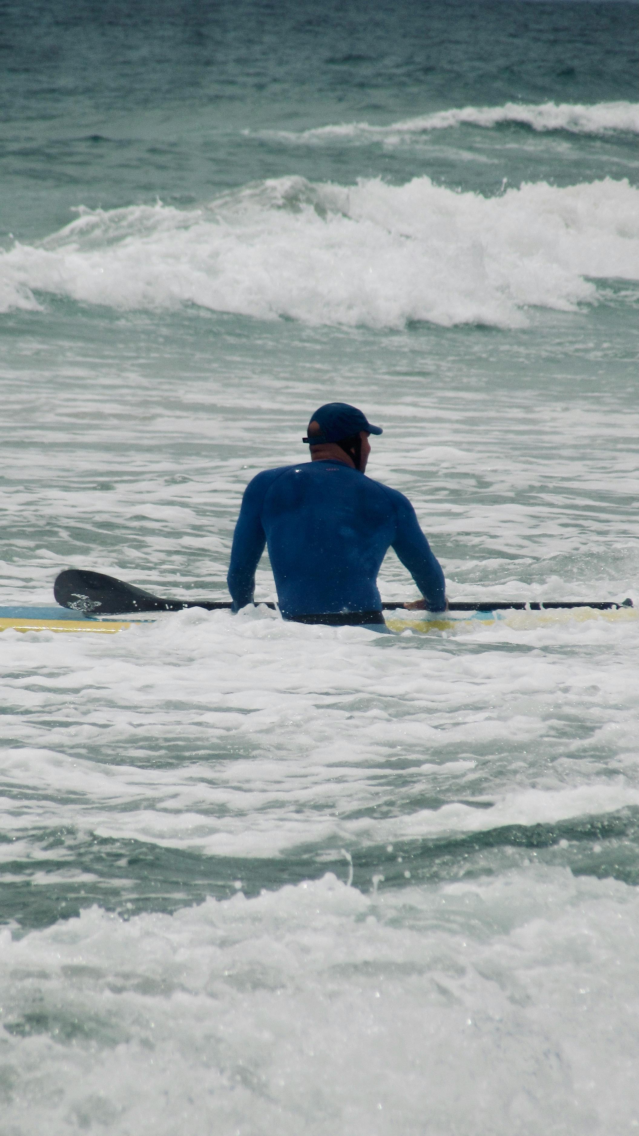 Two People Riding on a Paddleboard on Sea · Free Stock Photo