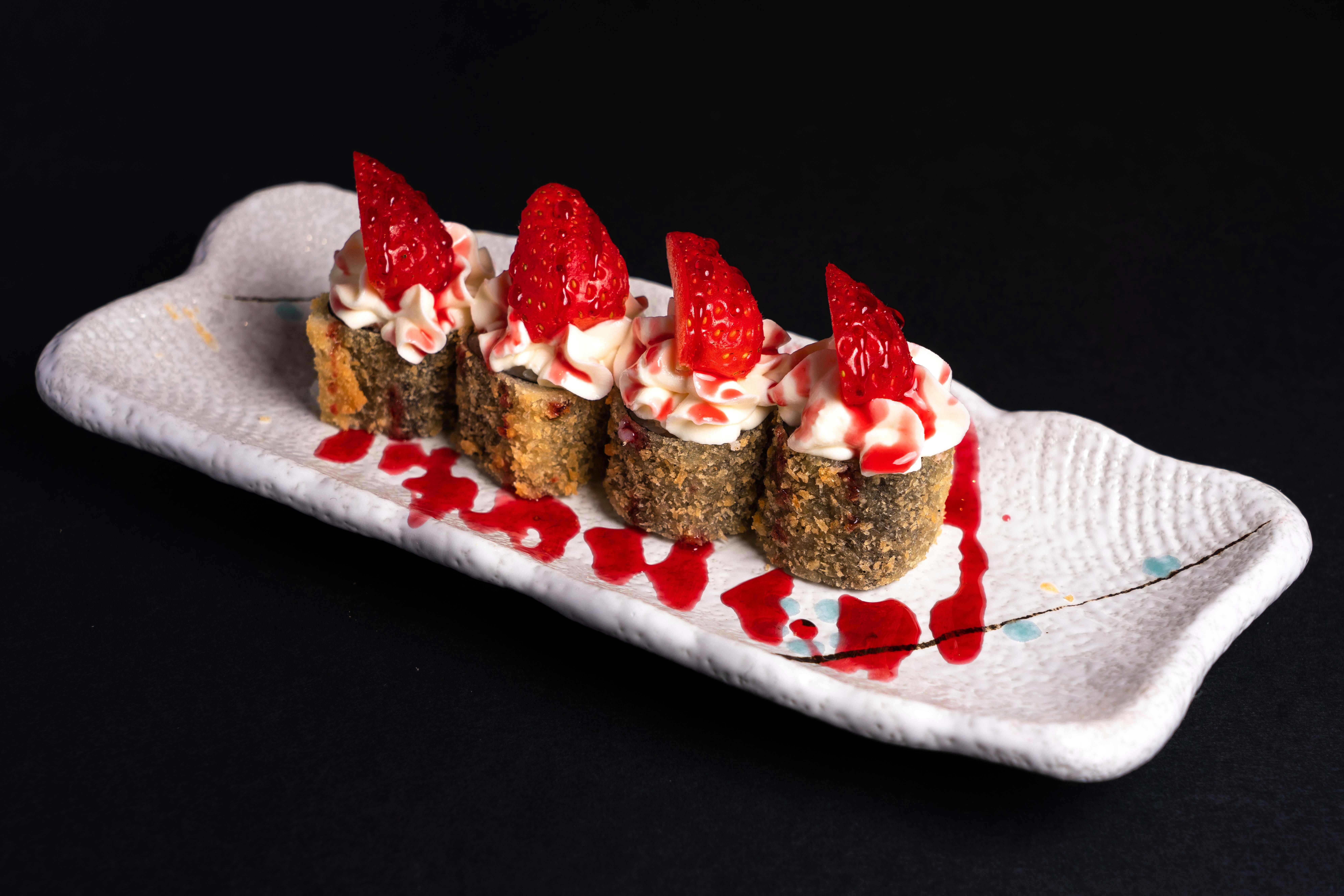 Sushi Rolls with Strawberries on Top · Free Stock Photo