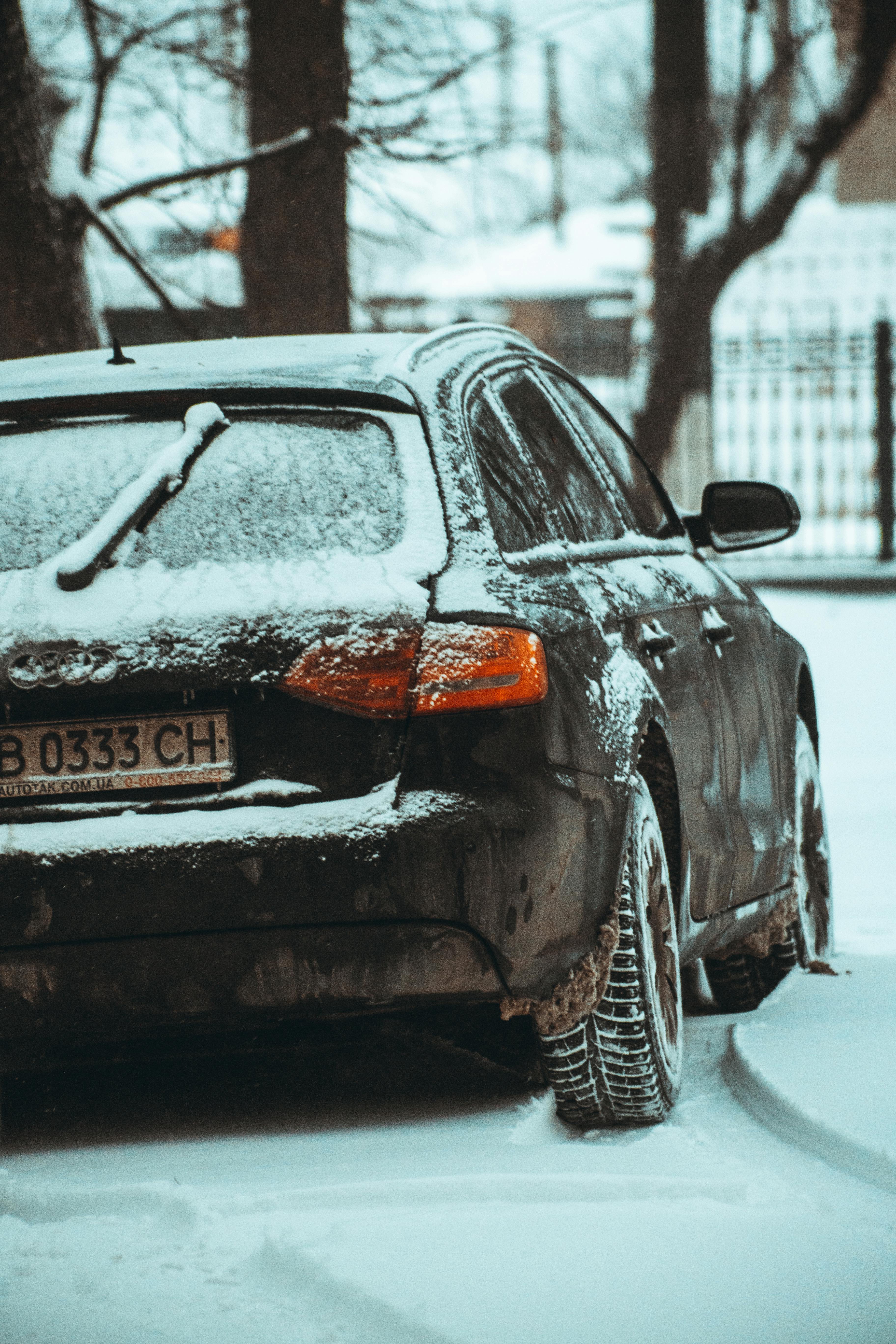 Black Car Covered in Snow Parked on the Street · Free Stock Photo