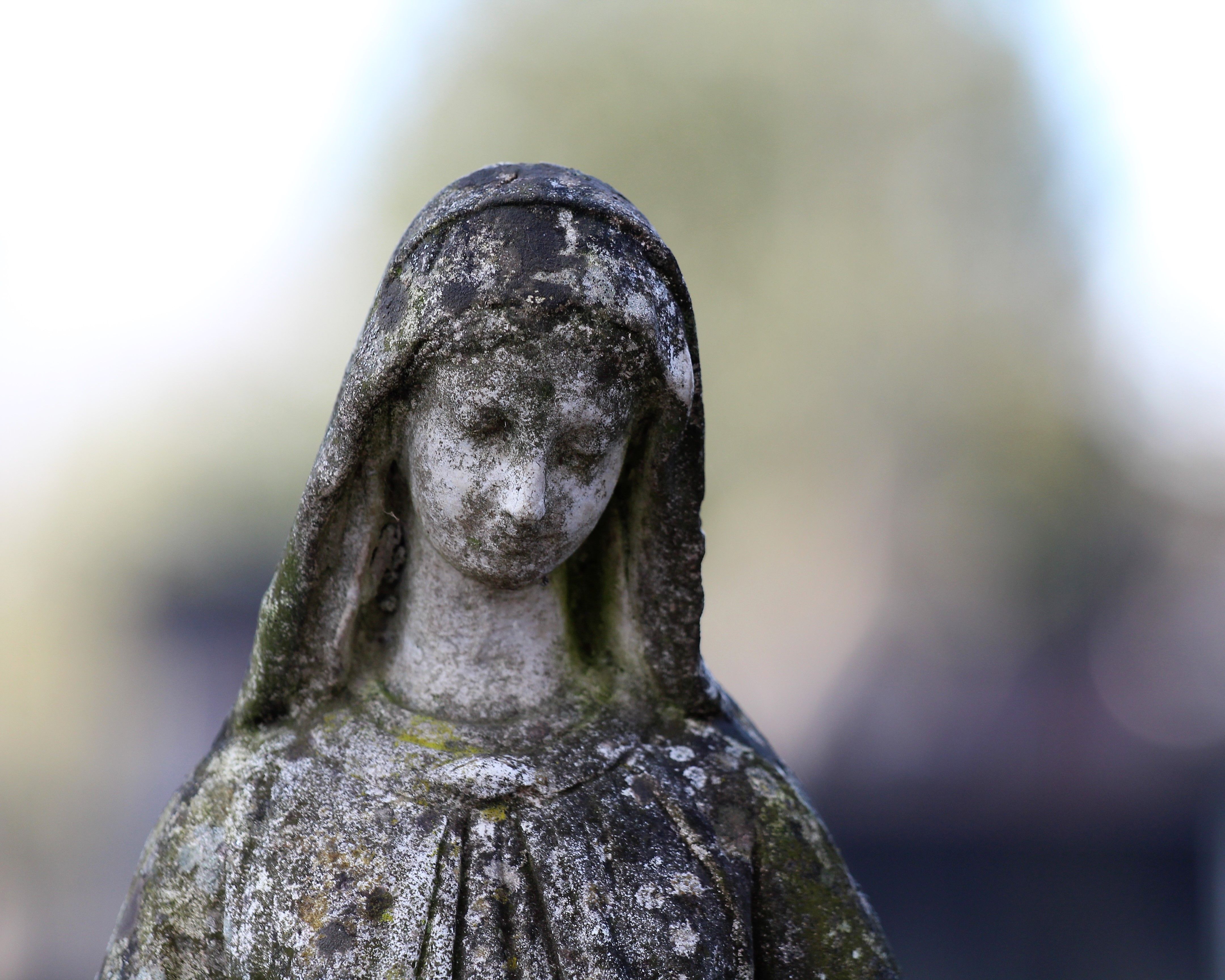 Close Up Photo of a Concrete Female Statue · Free Stock Photo