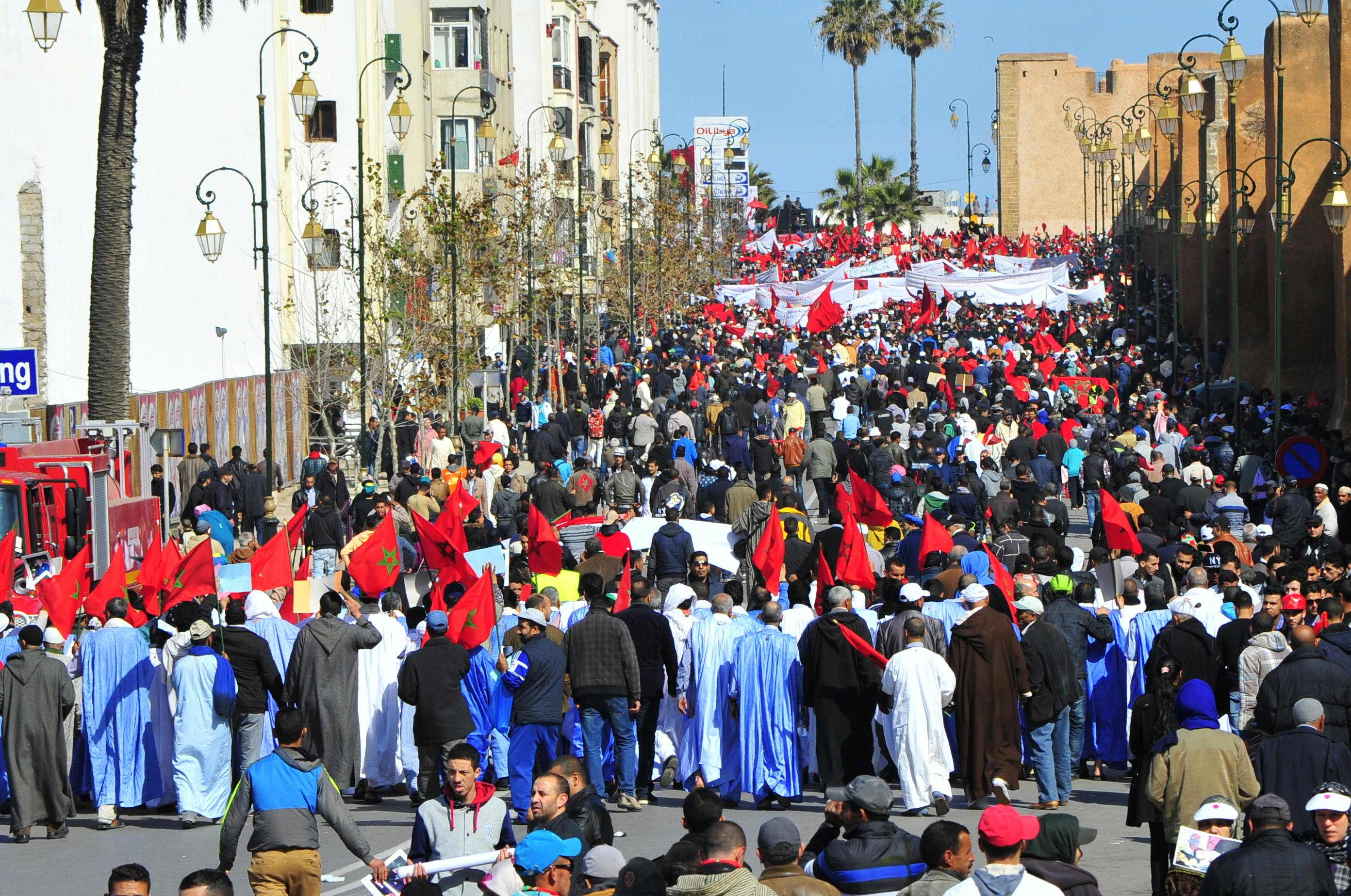 Photo of People Rallying in the Street · Free Stock Photo