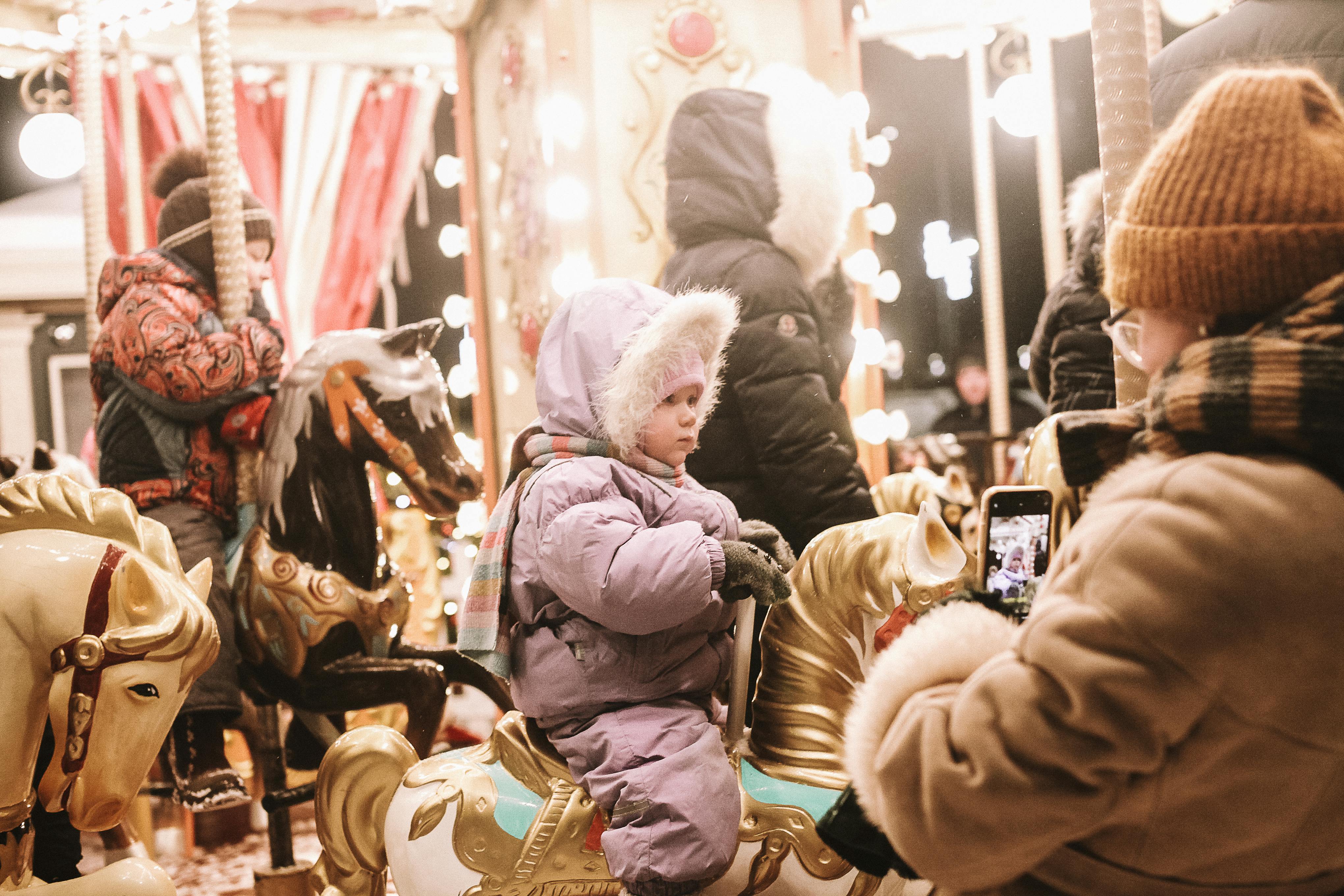 Kids on Carousel · Free Stock Photo