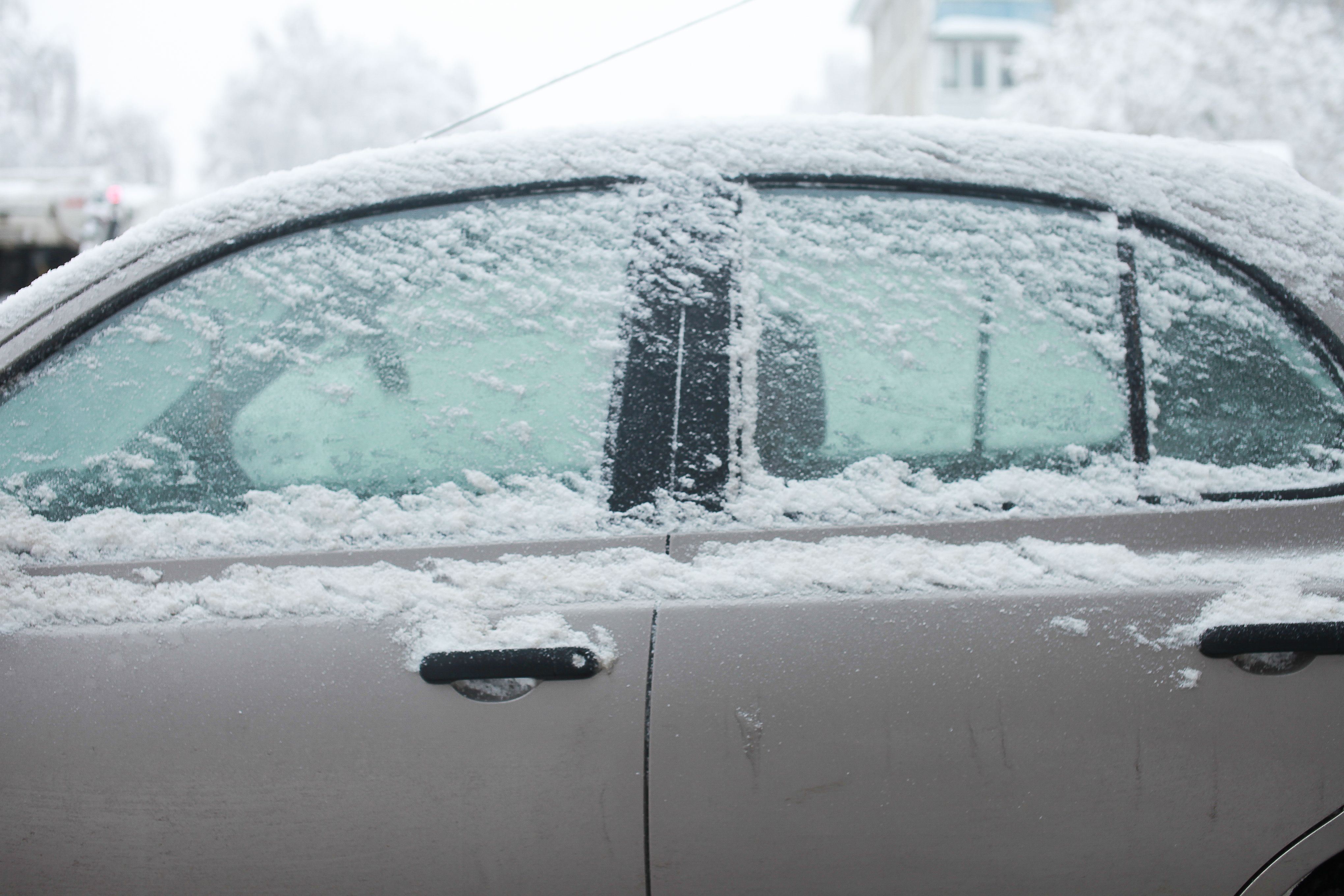 A Car Covered in Snow · Free Stock Photo