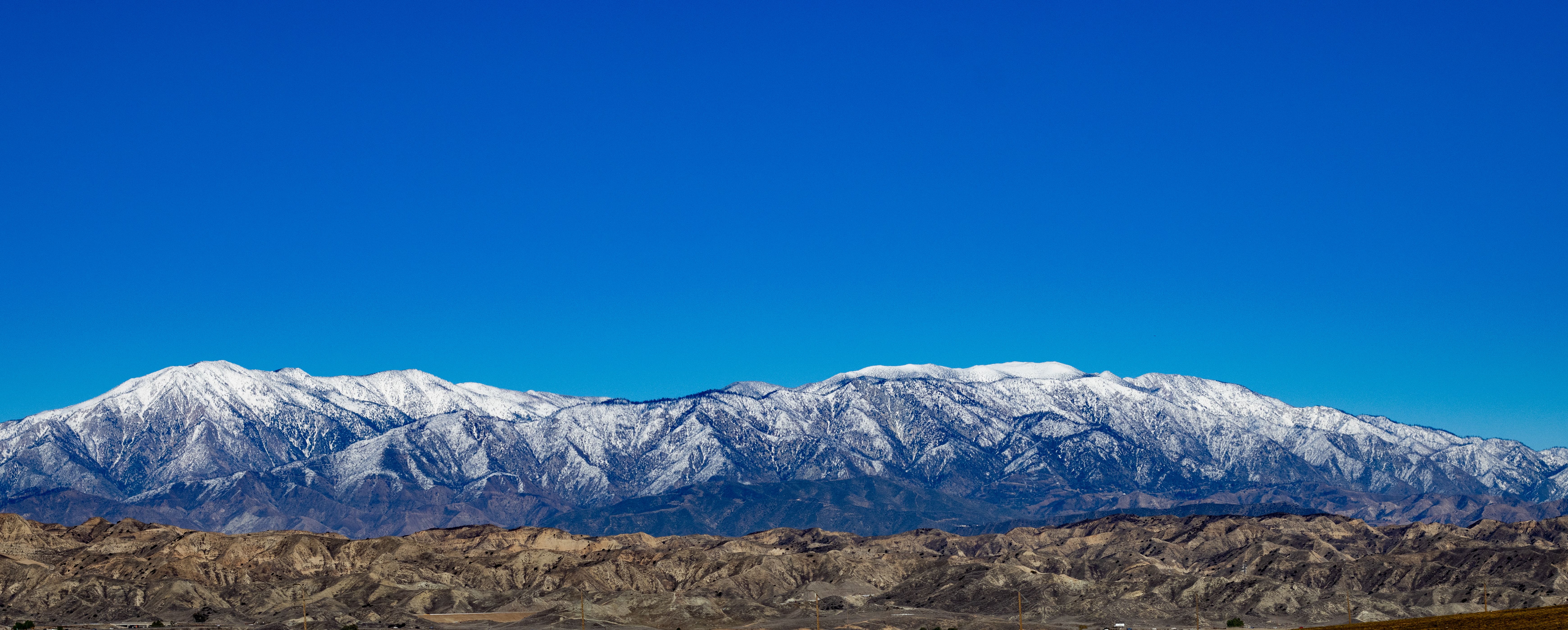 Blue Sky over Mountain Peak · Free Stock Photo