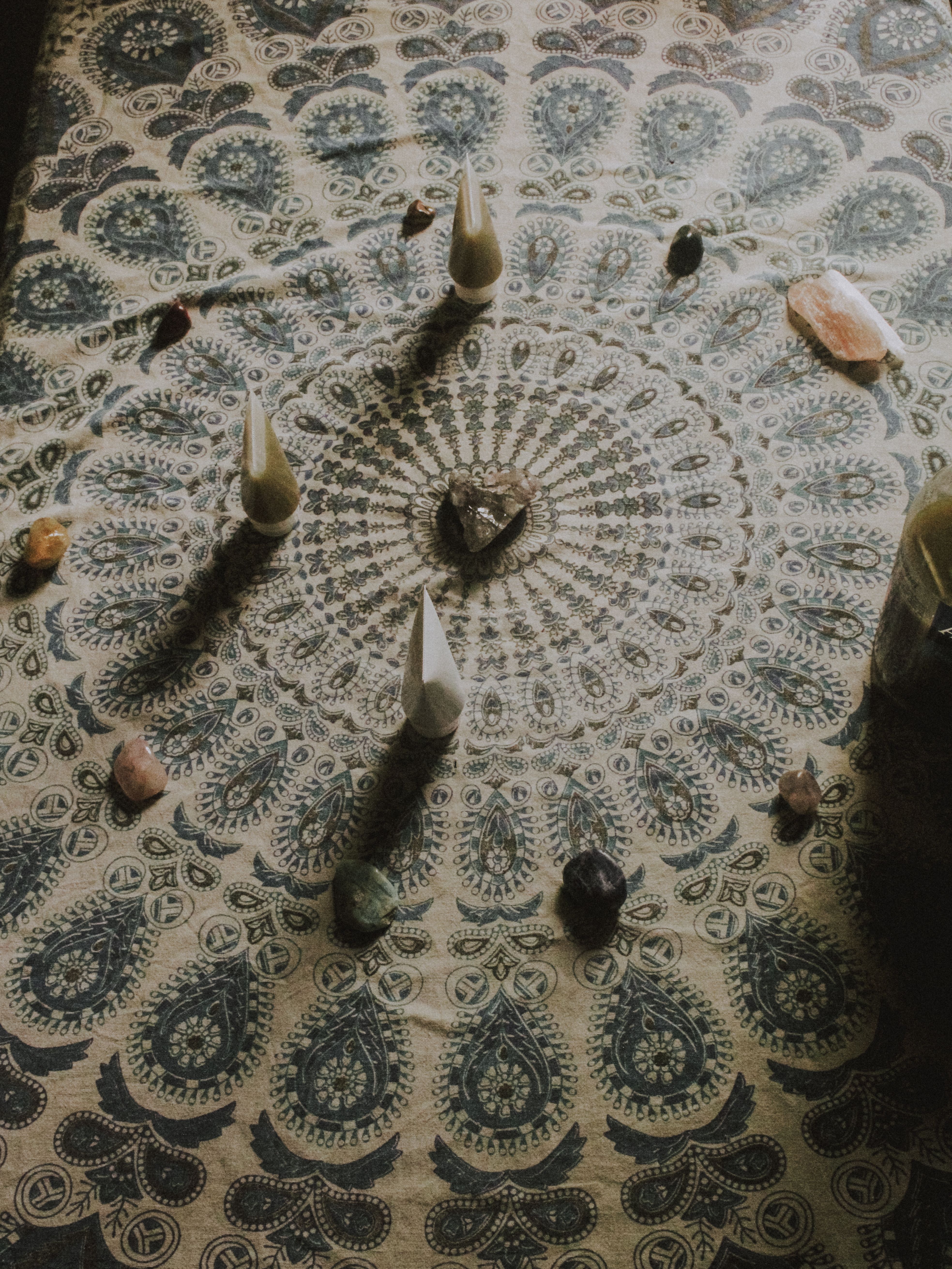 Stones on Geometric Cloth · Free Stock Photo