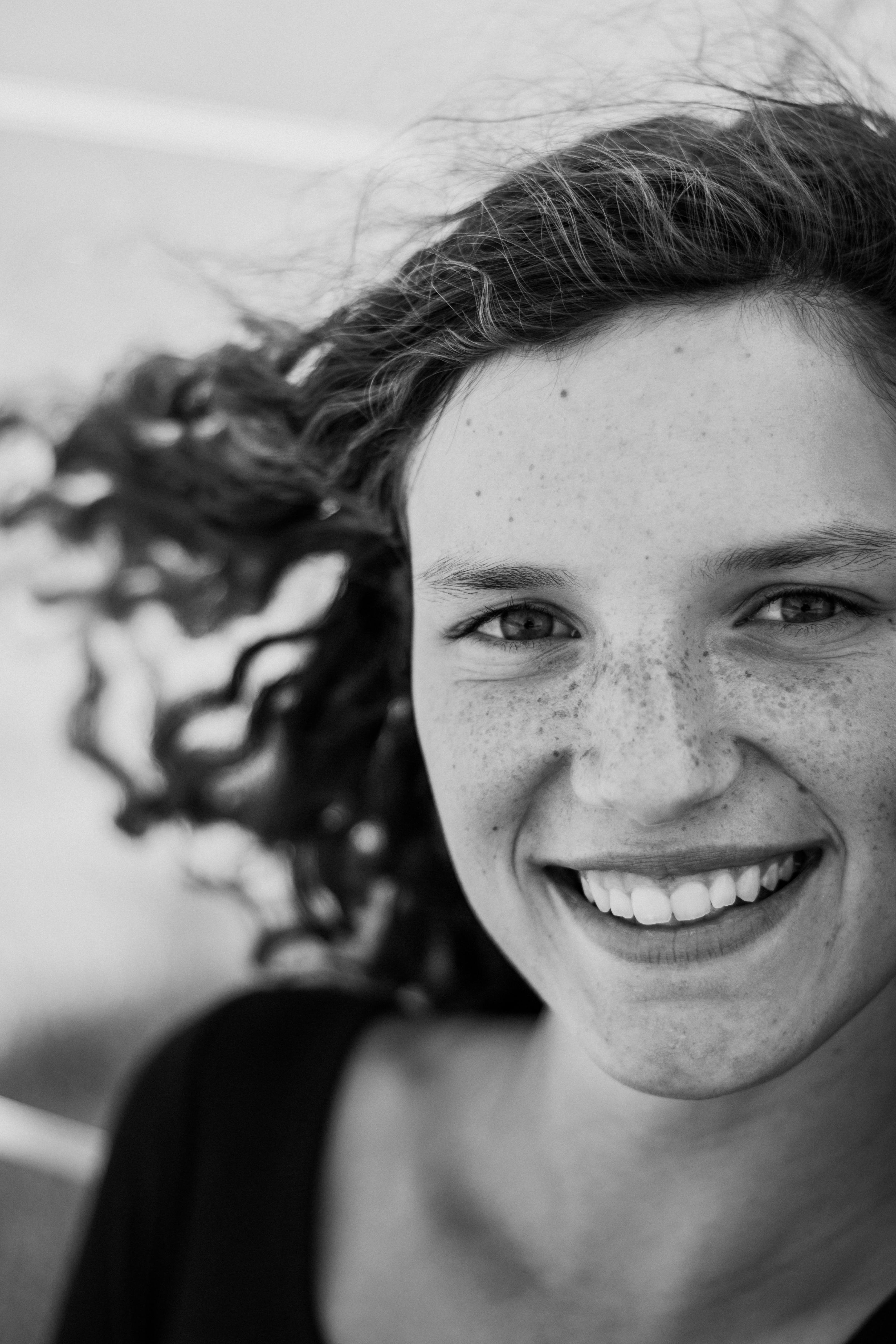 Black and White Portrait of Woman with Freckles Laughing · Free Stock Photo