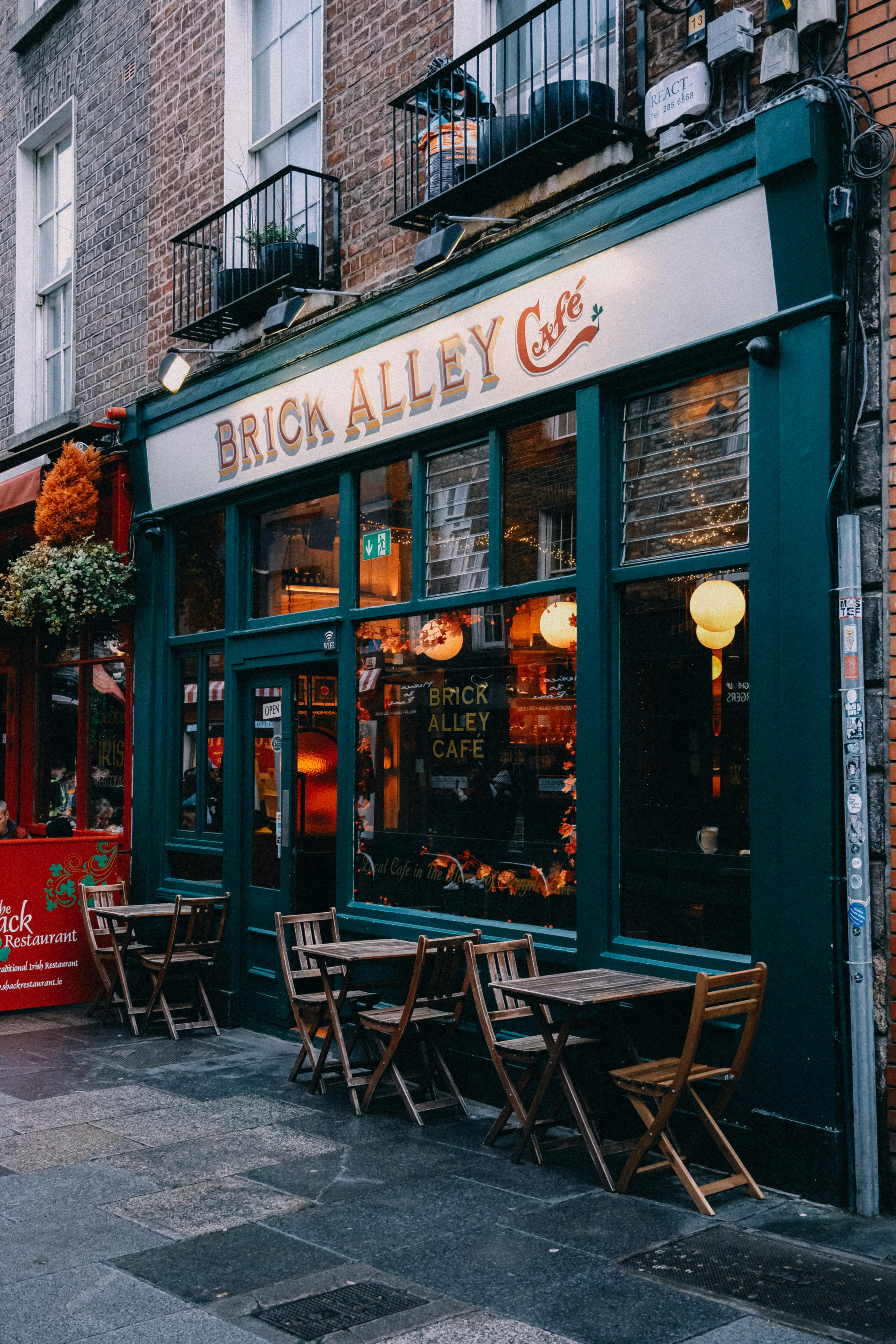 Cafe in a Traditional Building in City · Free Stock Photo