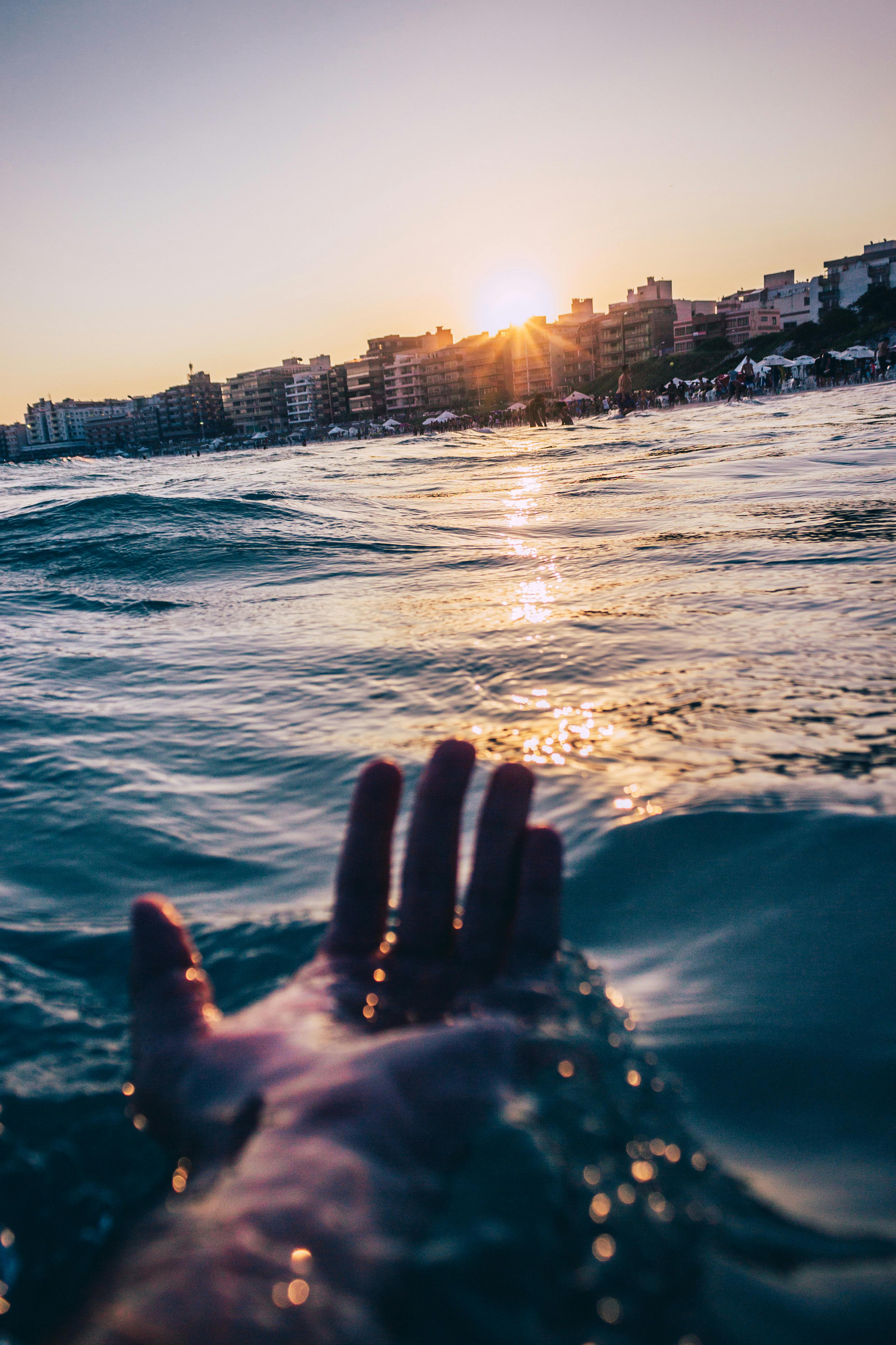 Person Soaking At The Beach · Free Stock Photo