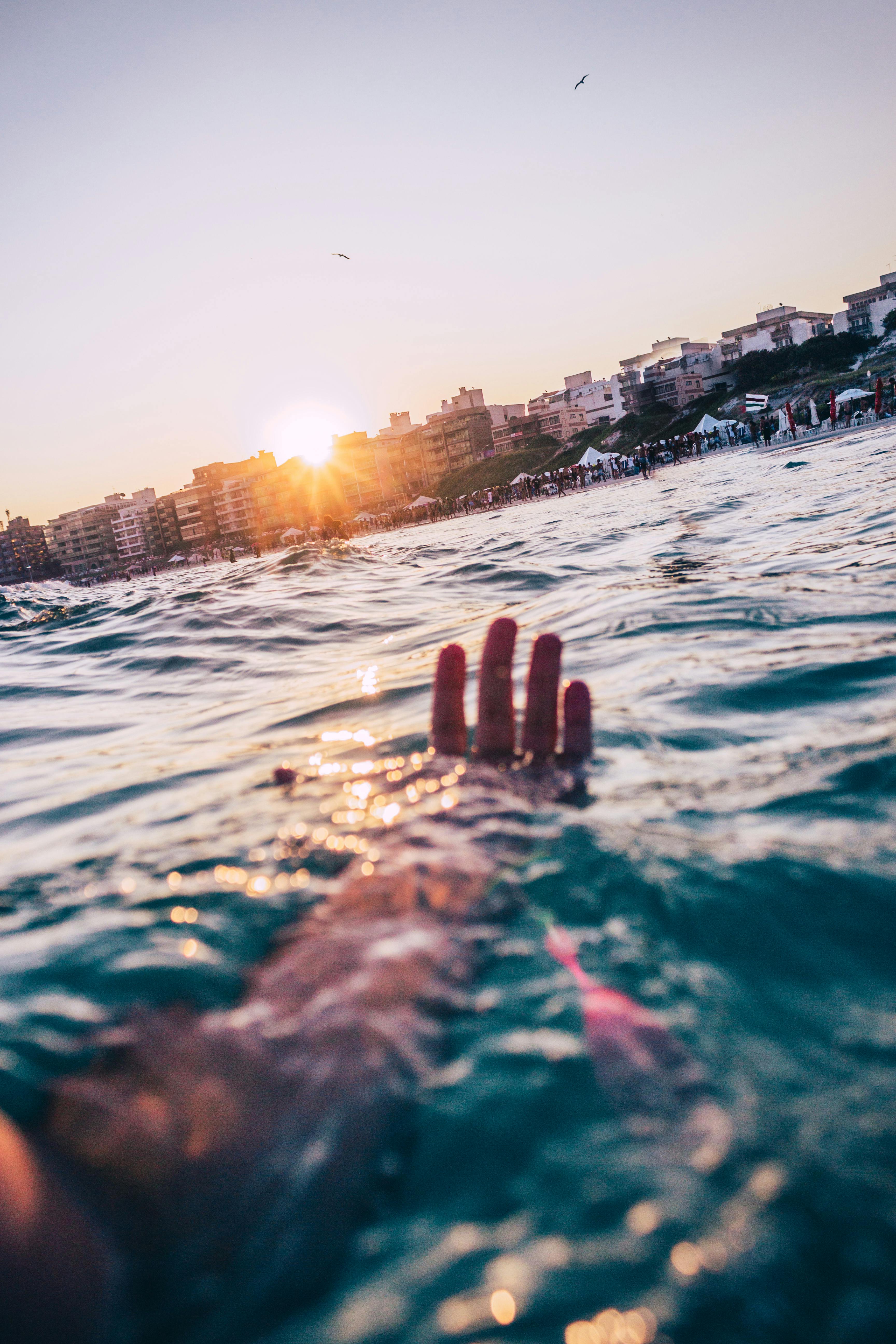 Person Swimming At The Beach · Free Stock Photo