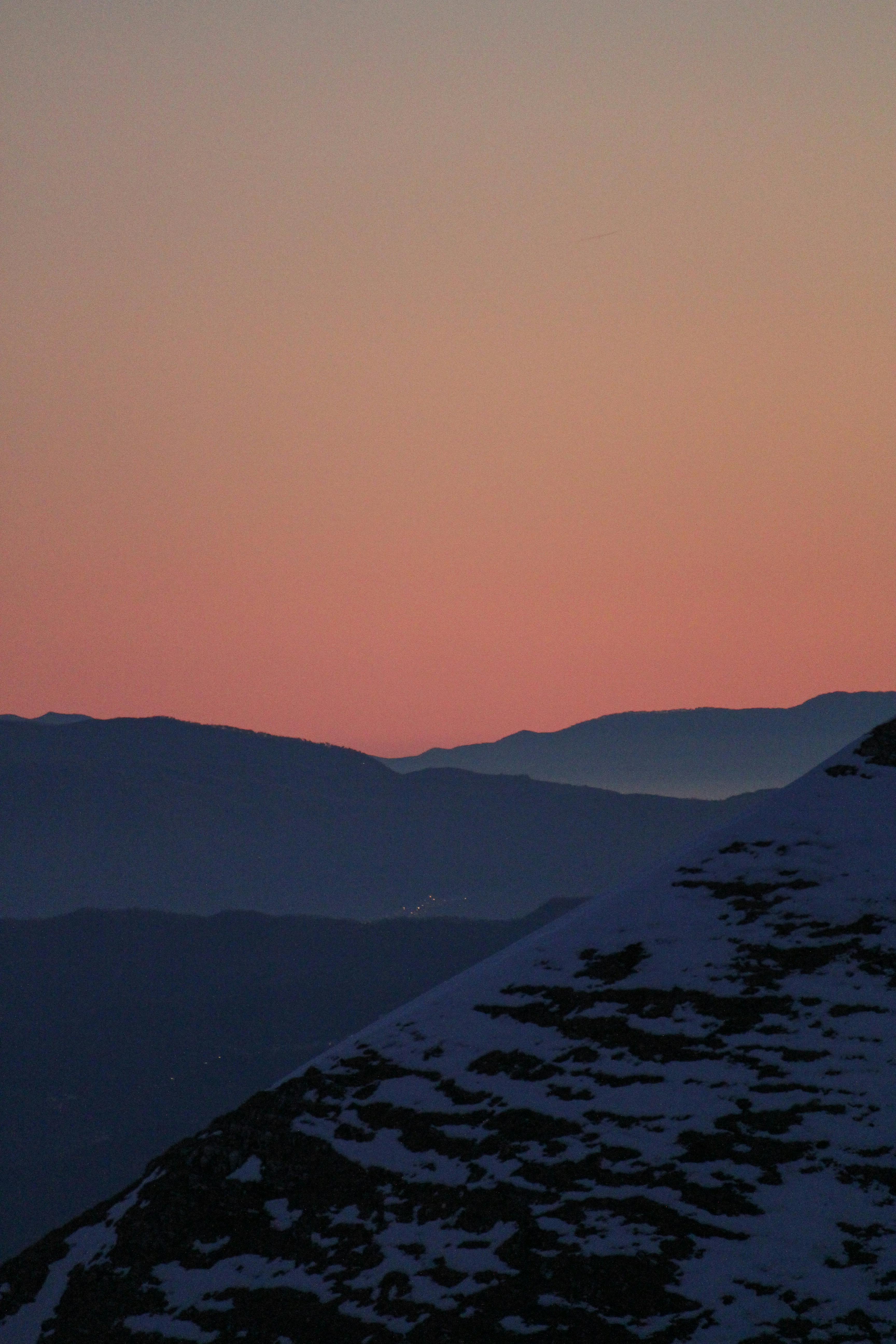 Mountains Covered with Snow During Sunset · Free Stock Photo