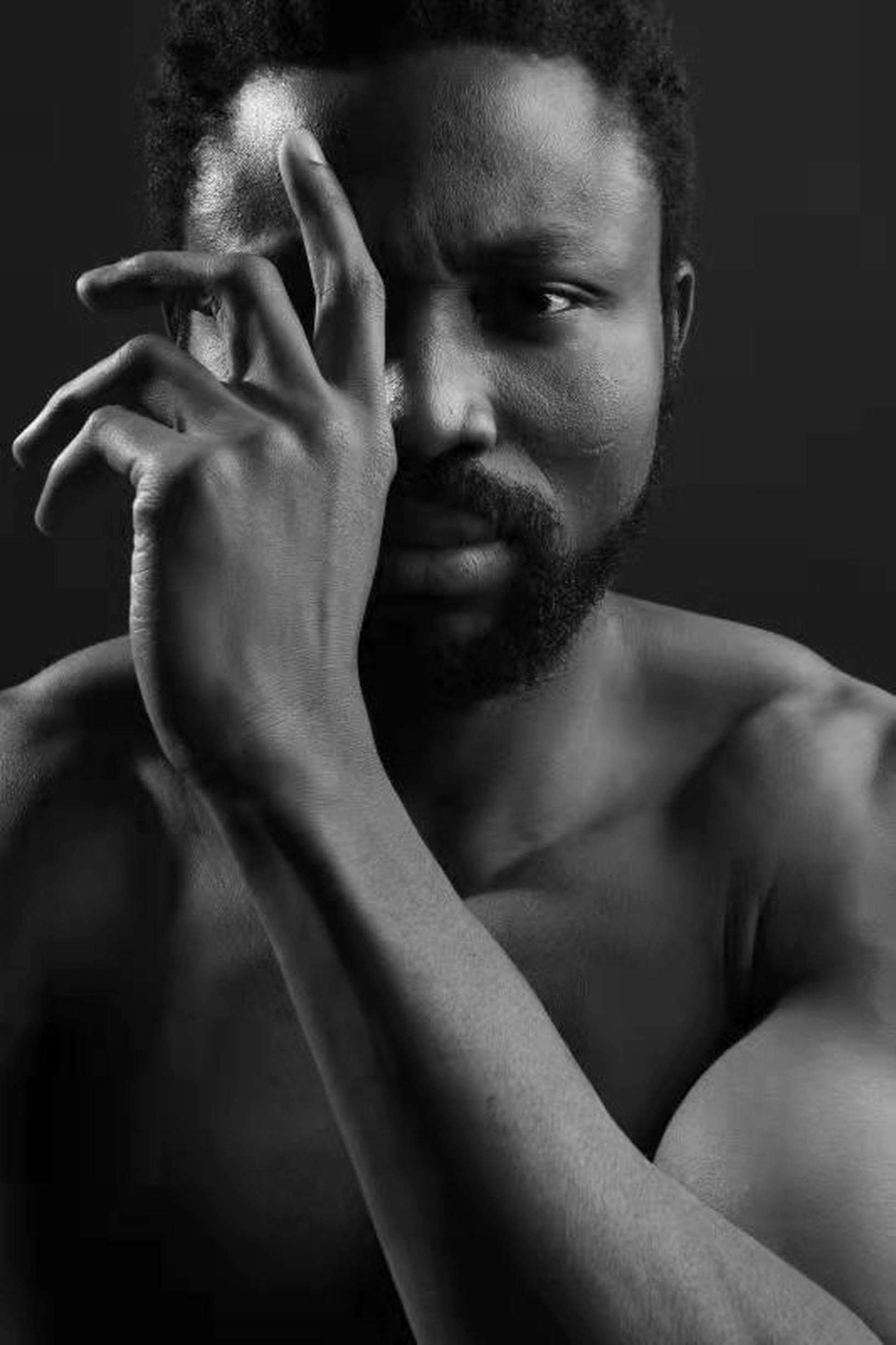 Portrait of Man Covering Half of his Face · Free Stock Photo