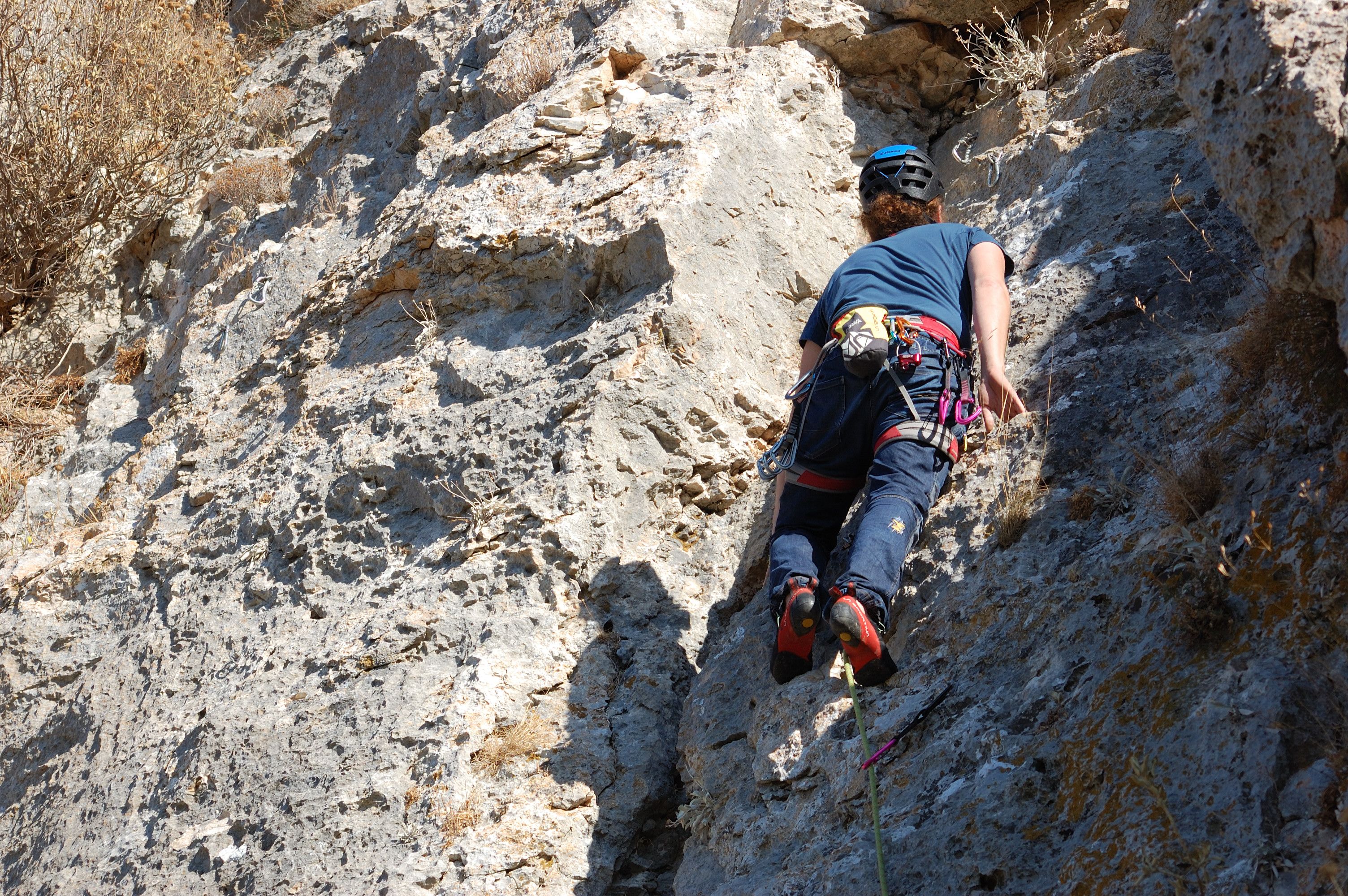 Man Climbing on Horizontal Rock · Free Stock Photo