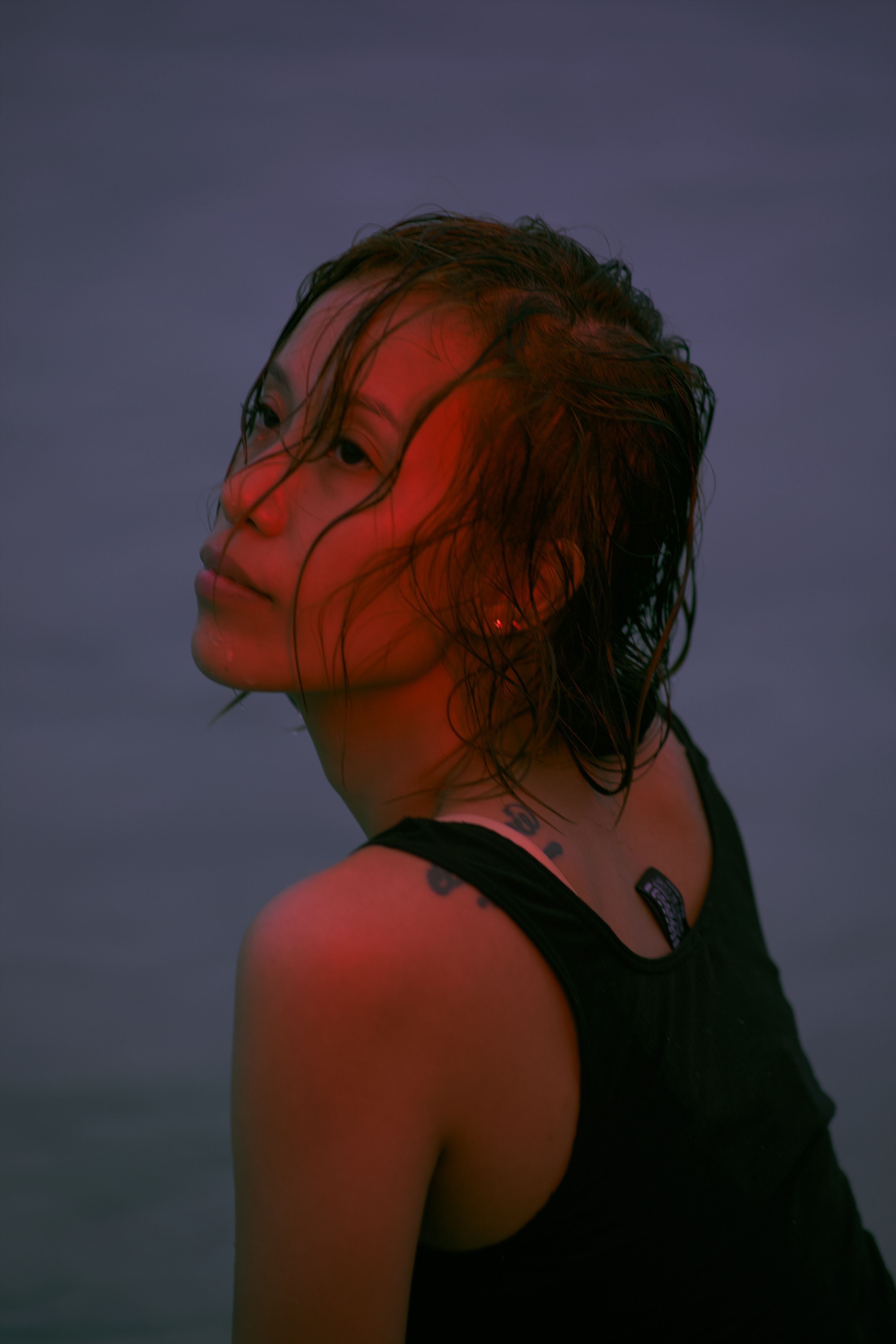 Girl Posing on Blur Sea Background · Free Stock Photo
