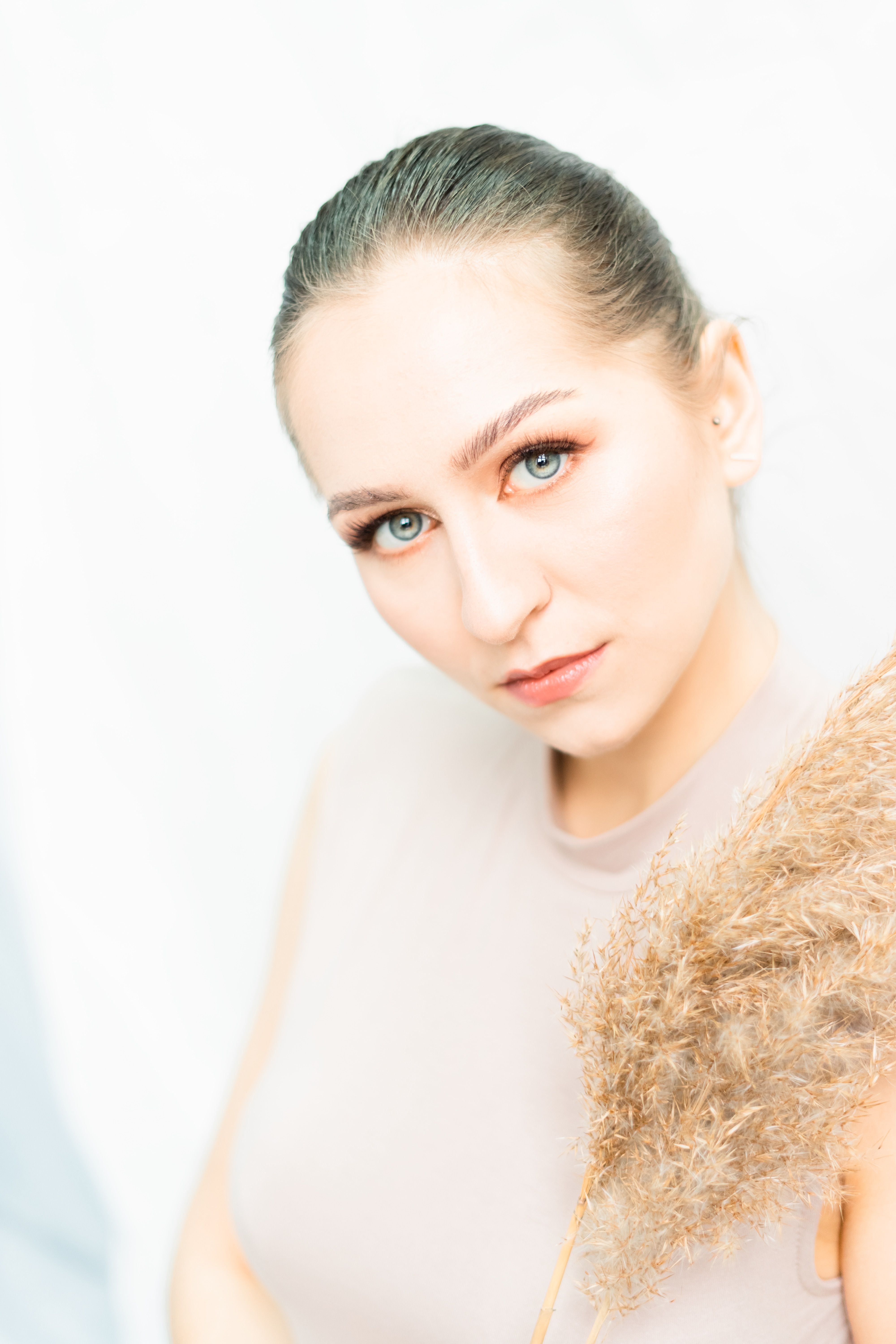 Portrait of Woman Against Black Background · Free Stock Photo