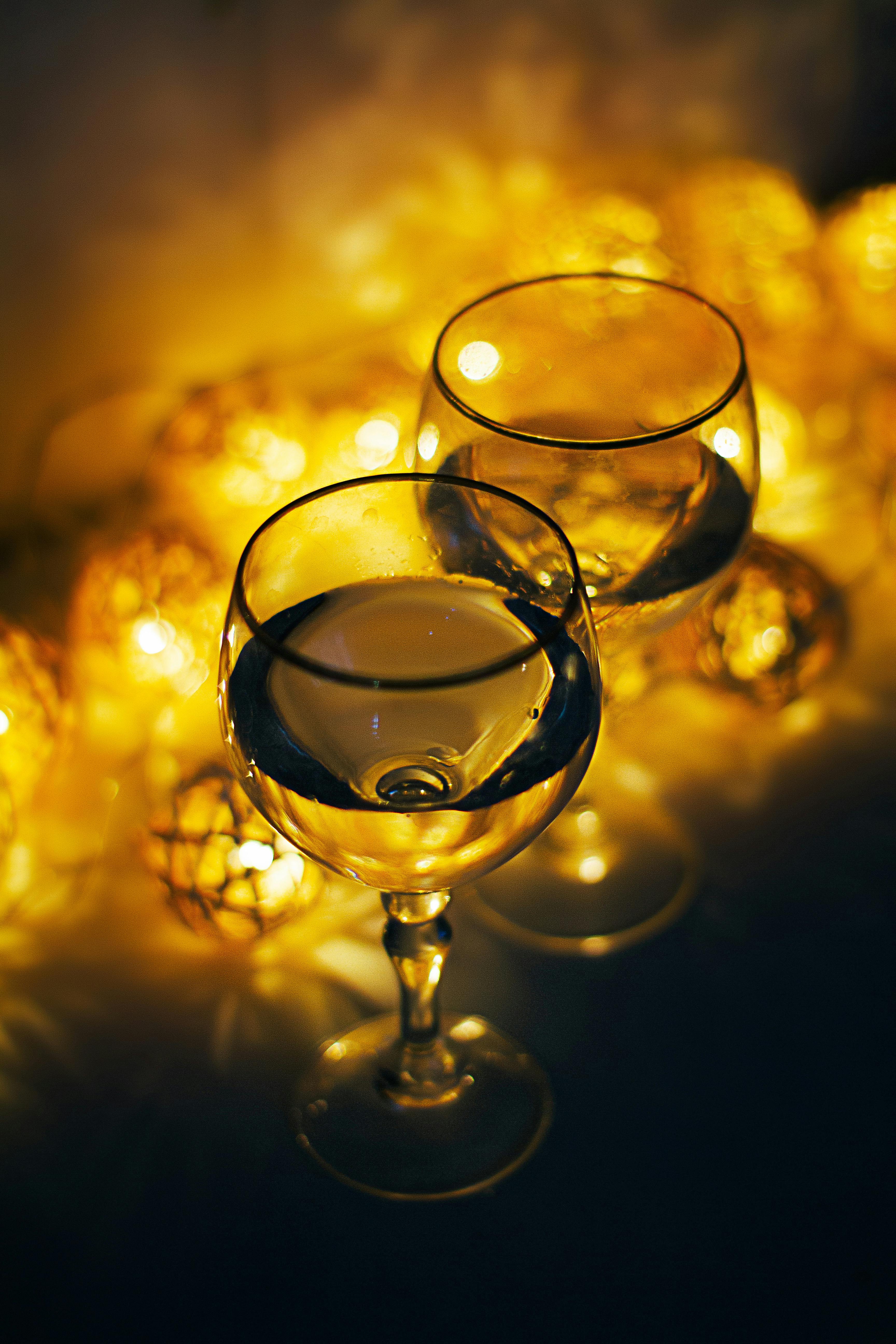 Clear Wine Glasses with Liquid · Free Stock Photo
