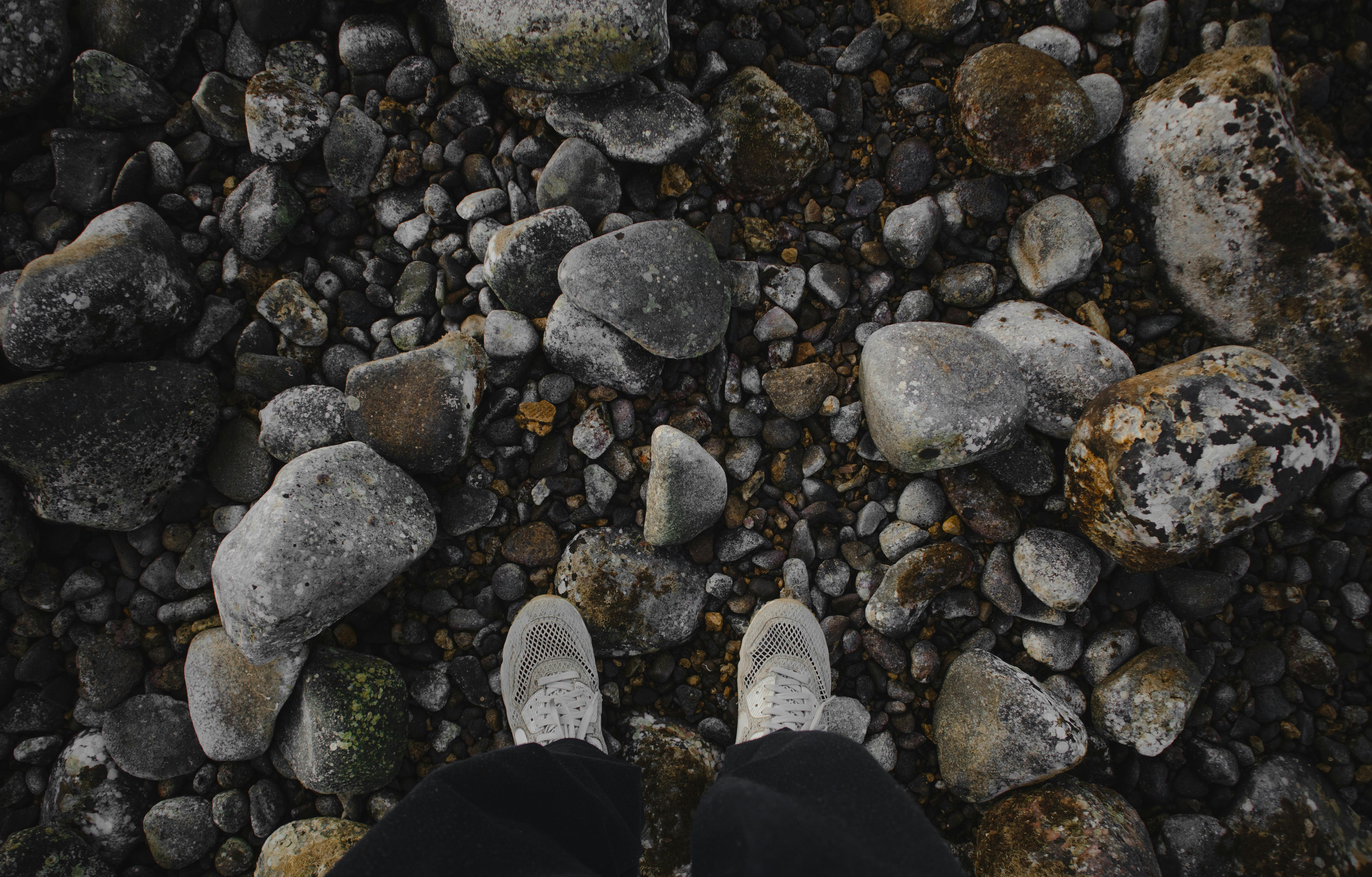 Person Standing on Rocks · Free Stock Photo