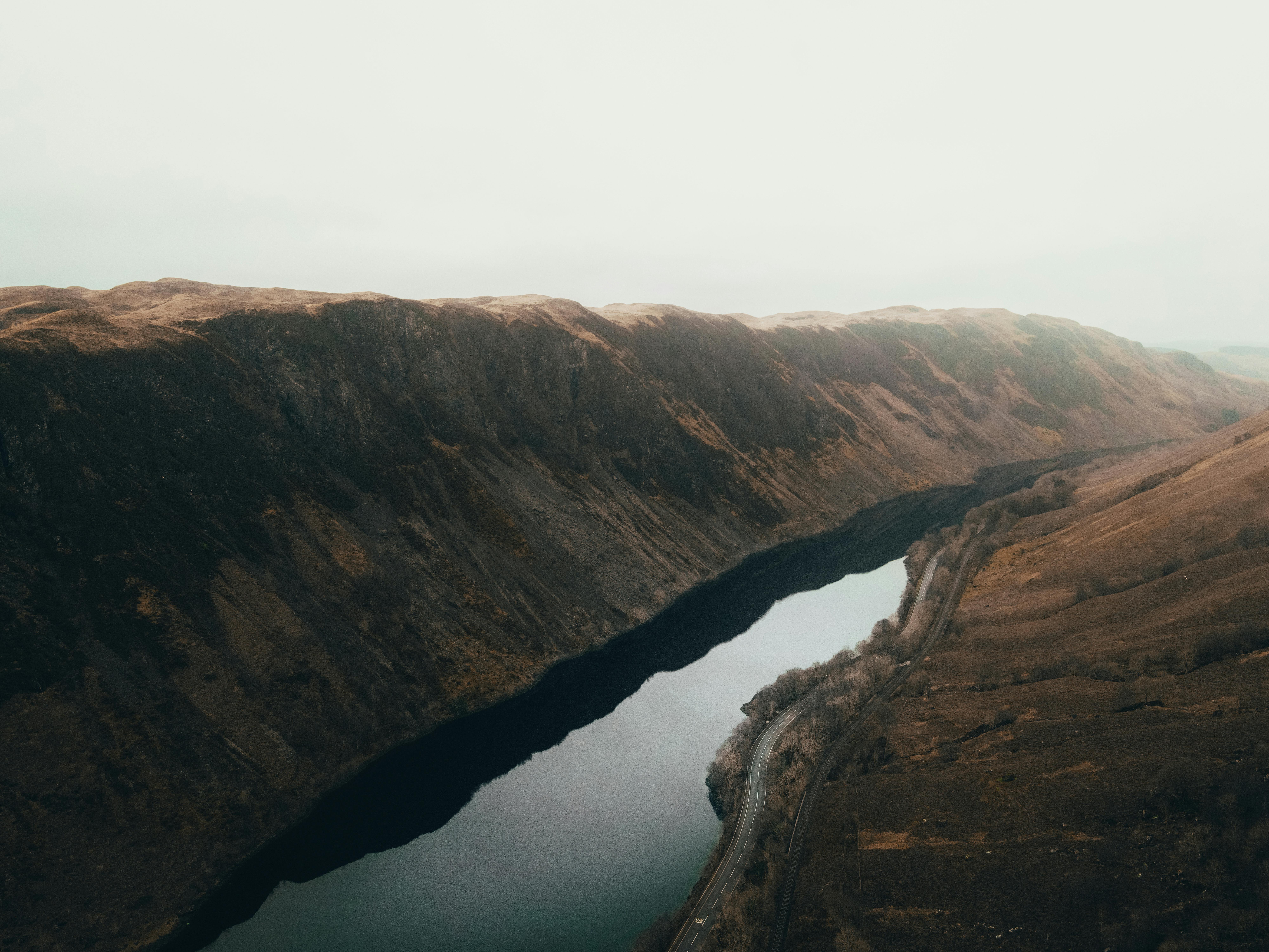 Barren Terrain in Fog and Canal · Free Stock Photo