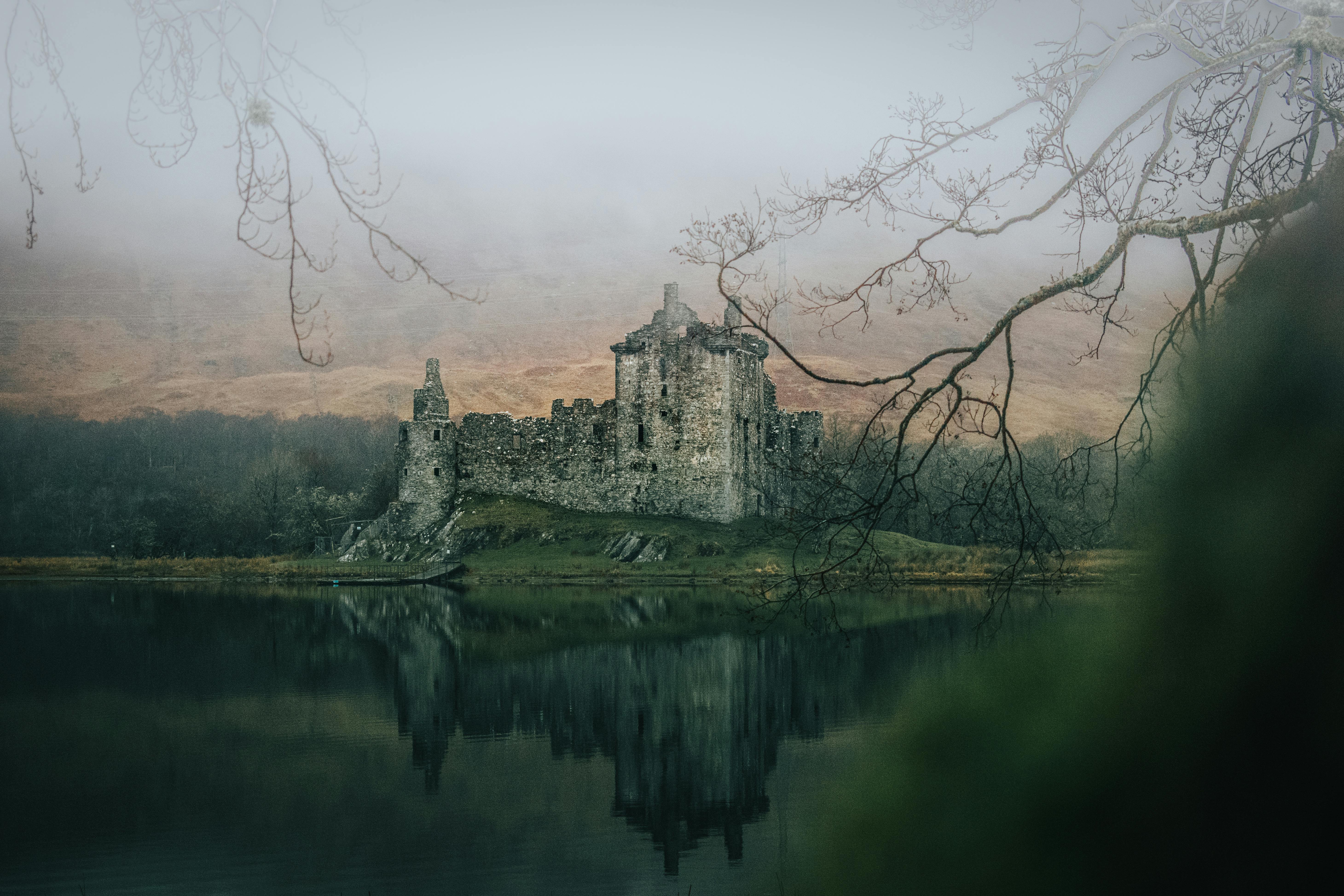 Old Stone Castle on Hill Reflection in Water · Free Stock Photo