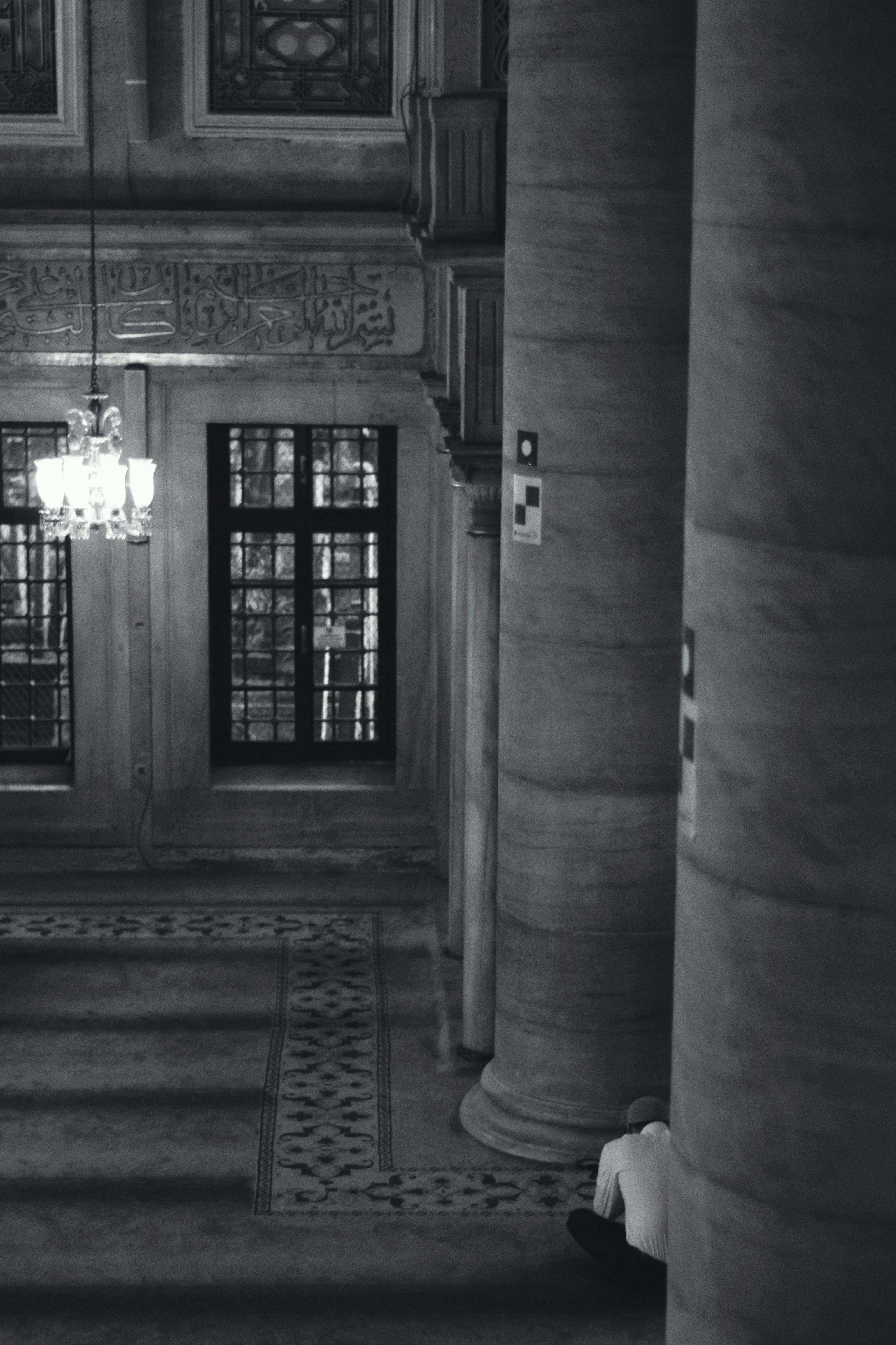 Grayscale Photo of Concrete Pillars · Free Stock Photo