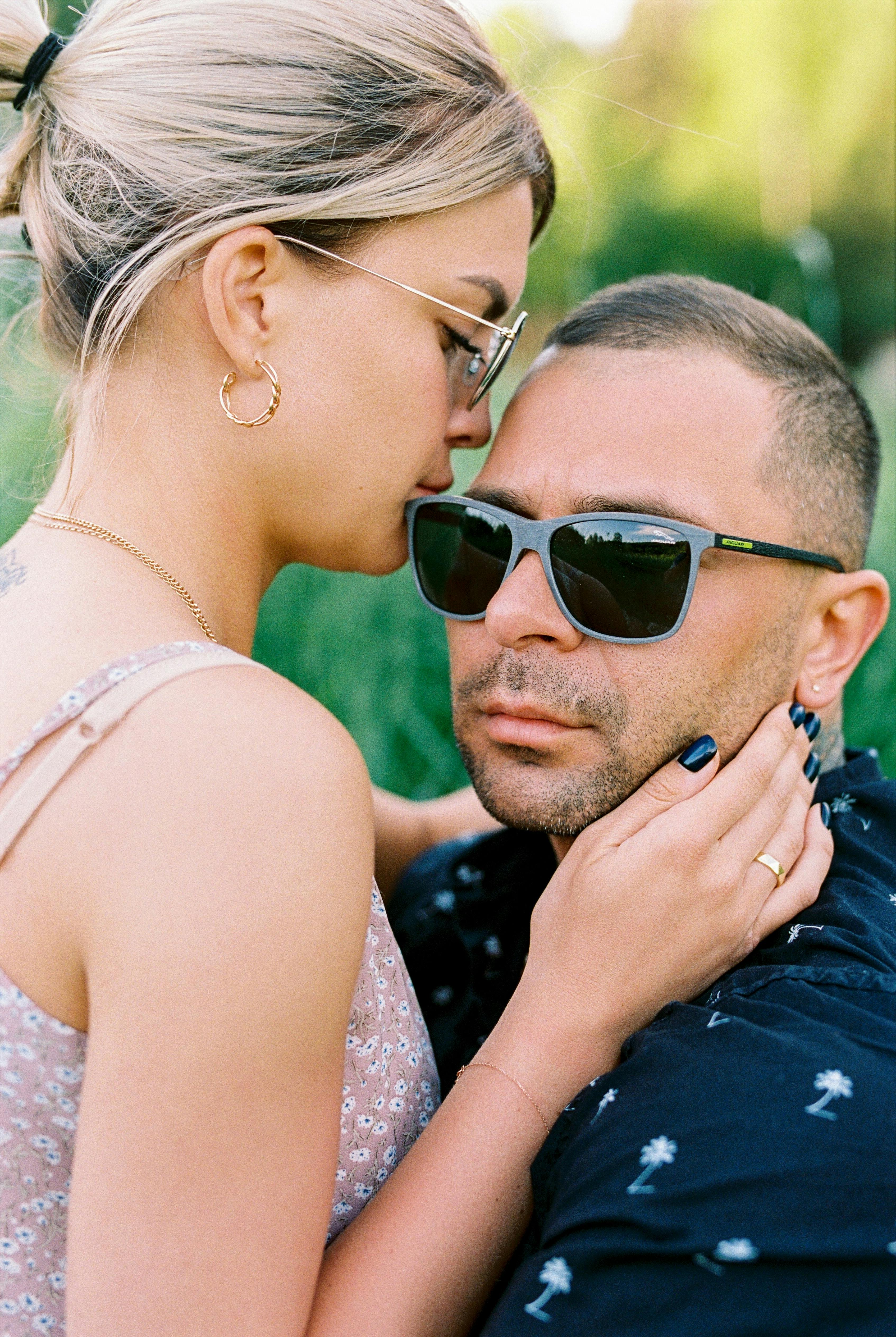 View of Couple Holding Hands · Free Stock Photo