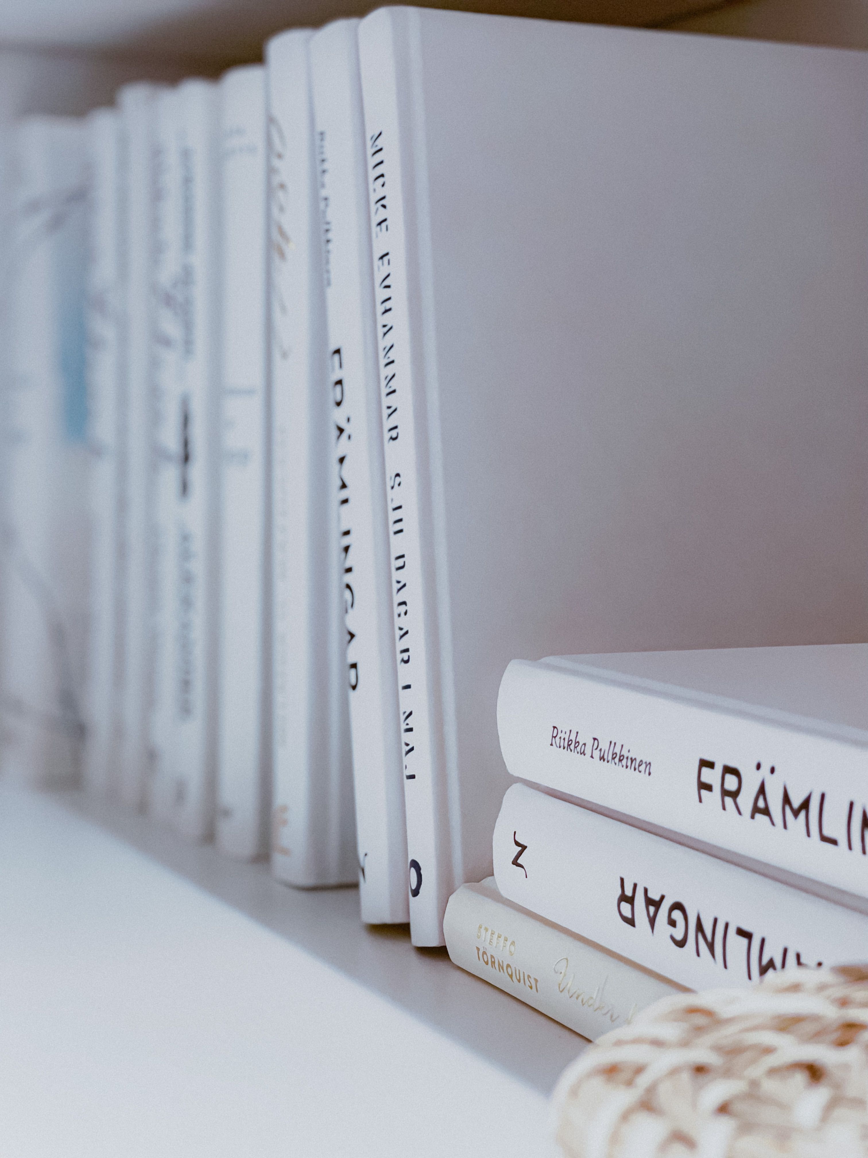 A Collection of White Books in Close-up Shot · Free Stock Photo