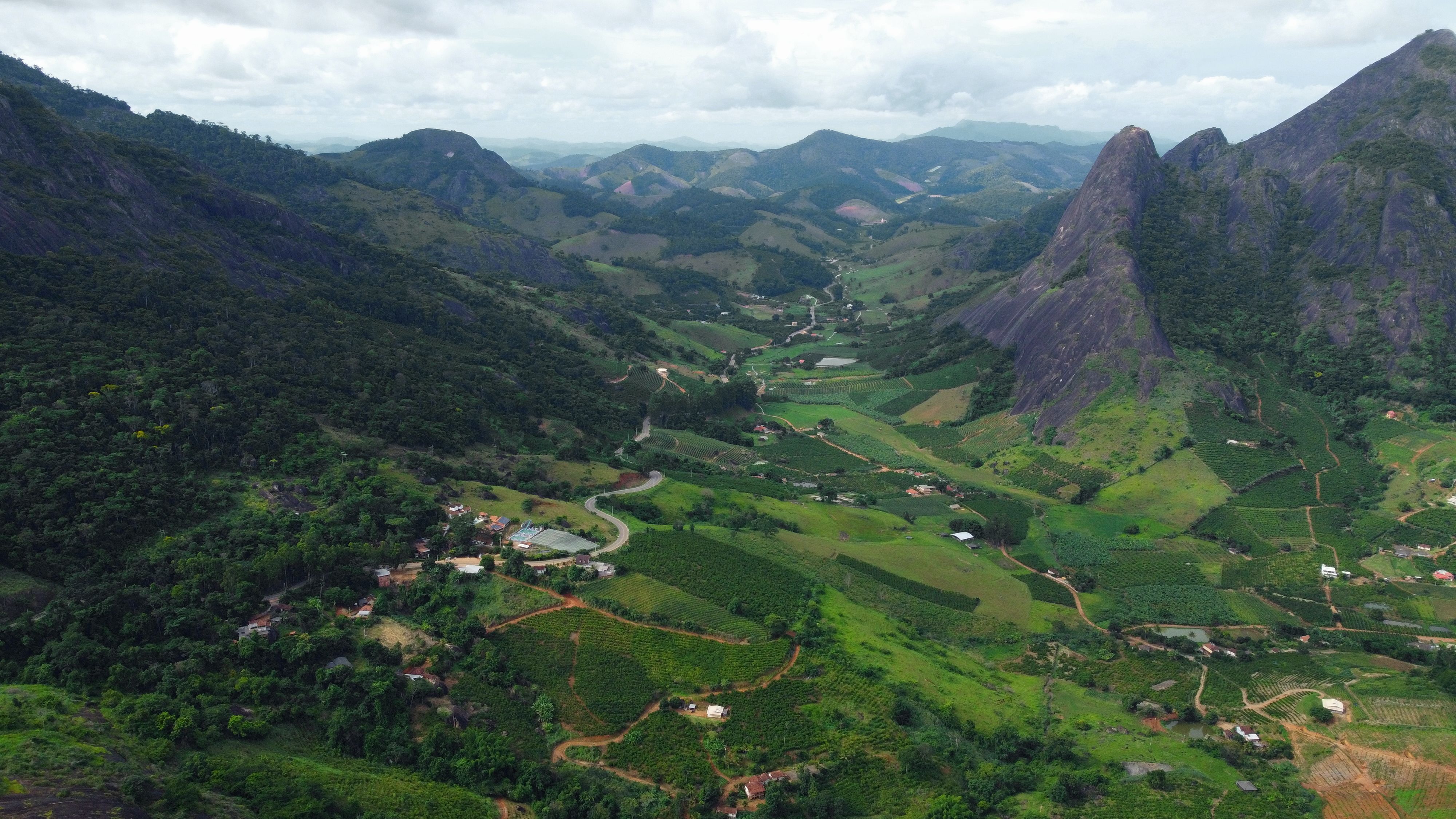 Green Fields Between Green Mountains · Free Stock Photo