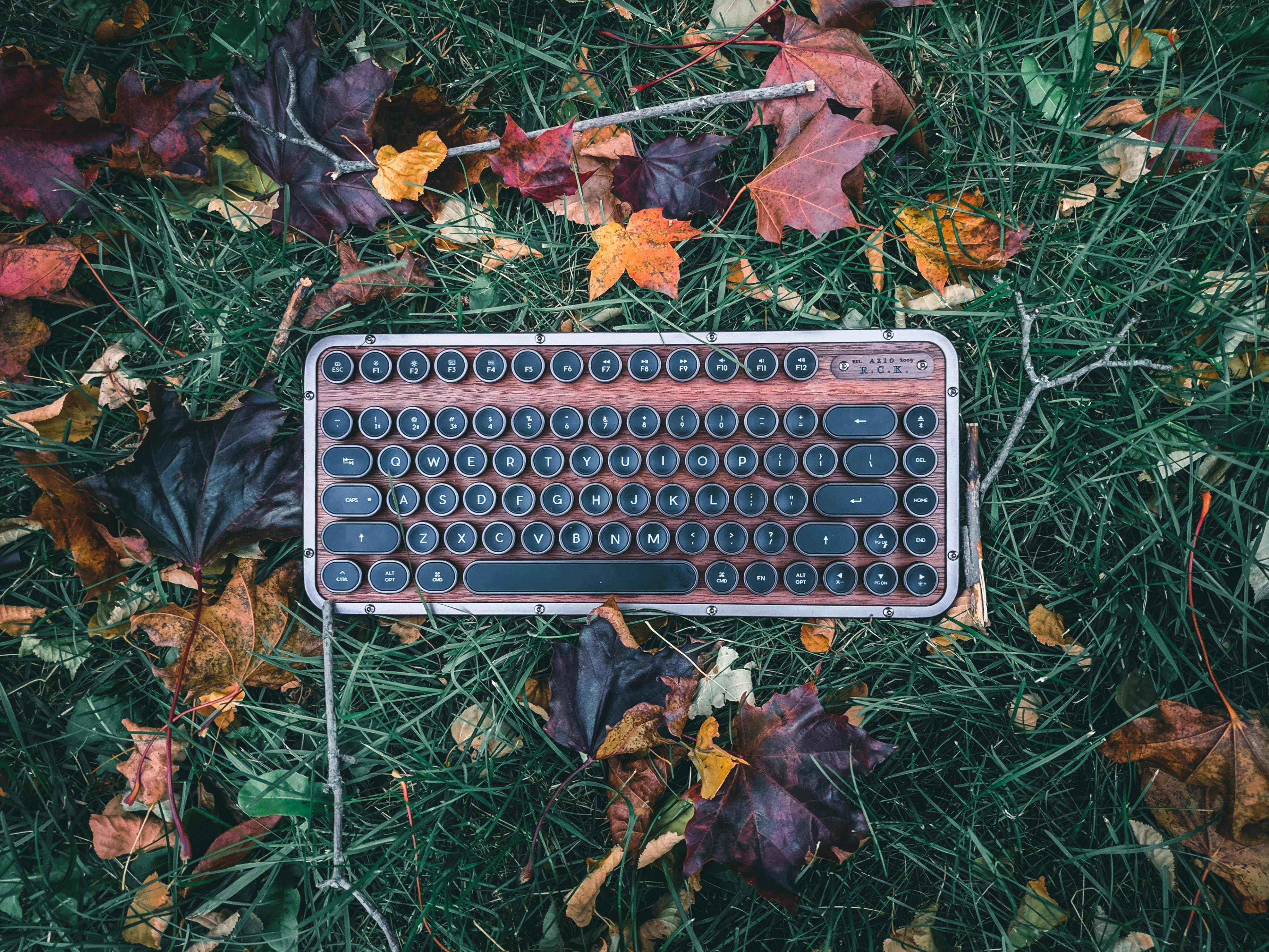 Wooden Keyboard on Grass · Free Stock Photo