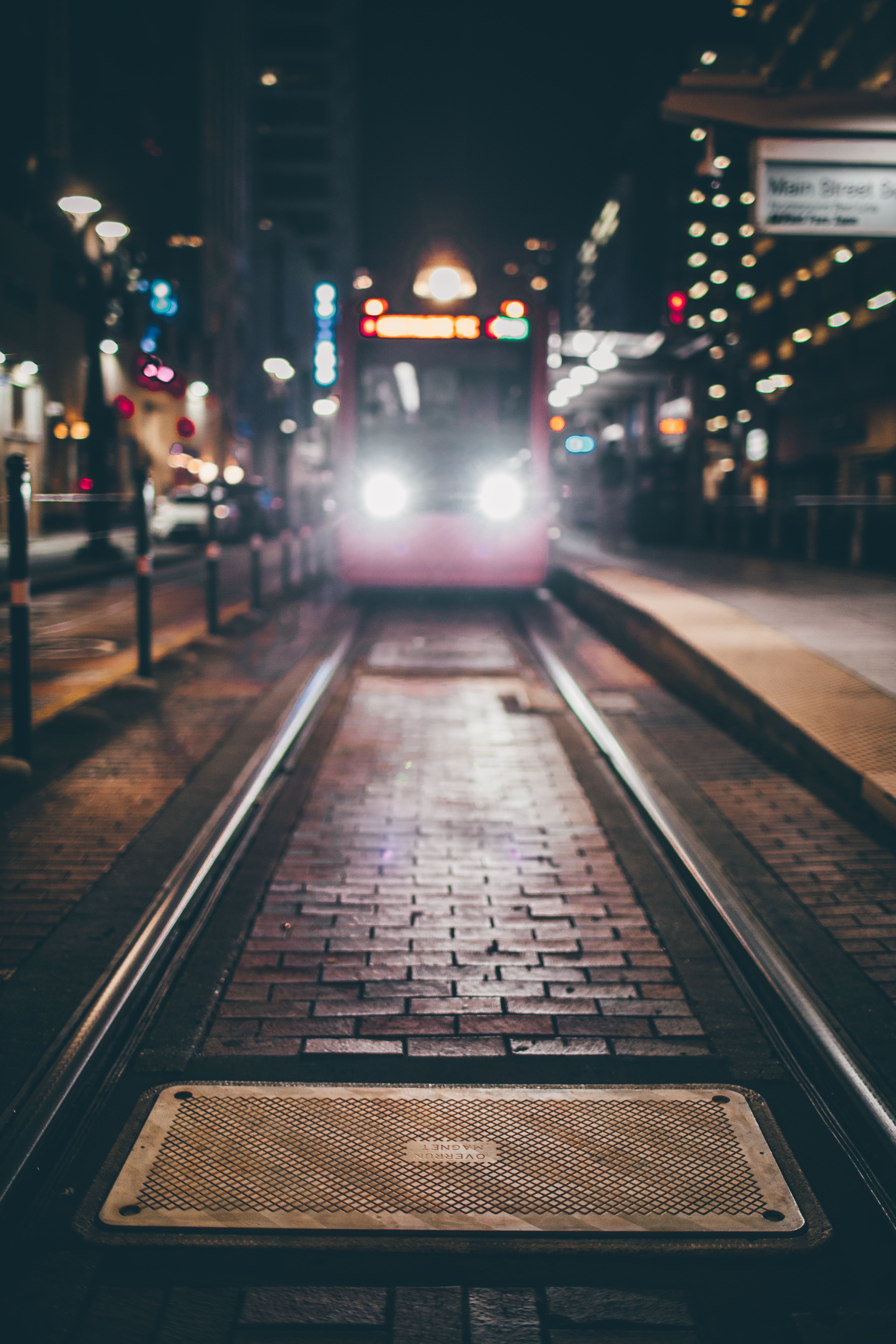 Houston Metro Train Riding on a Night Street · Free Stock Photo