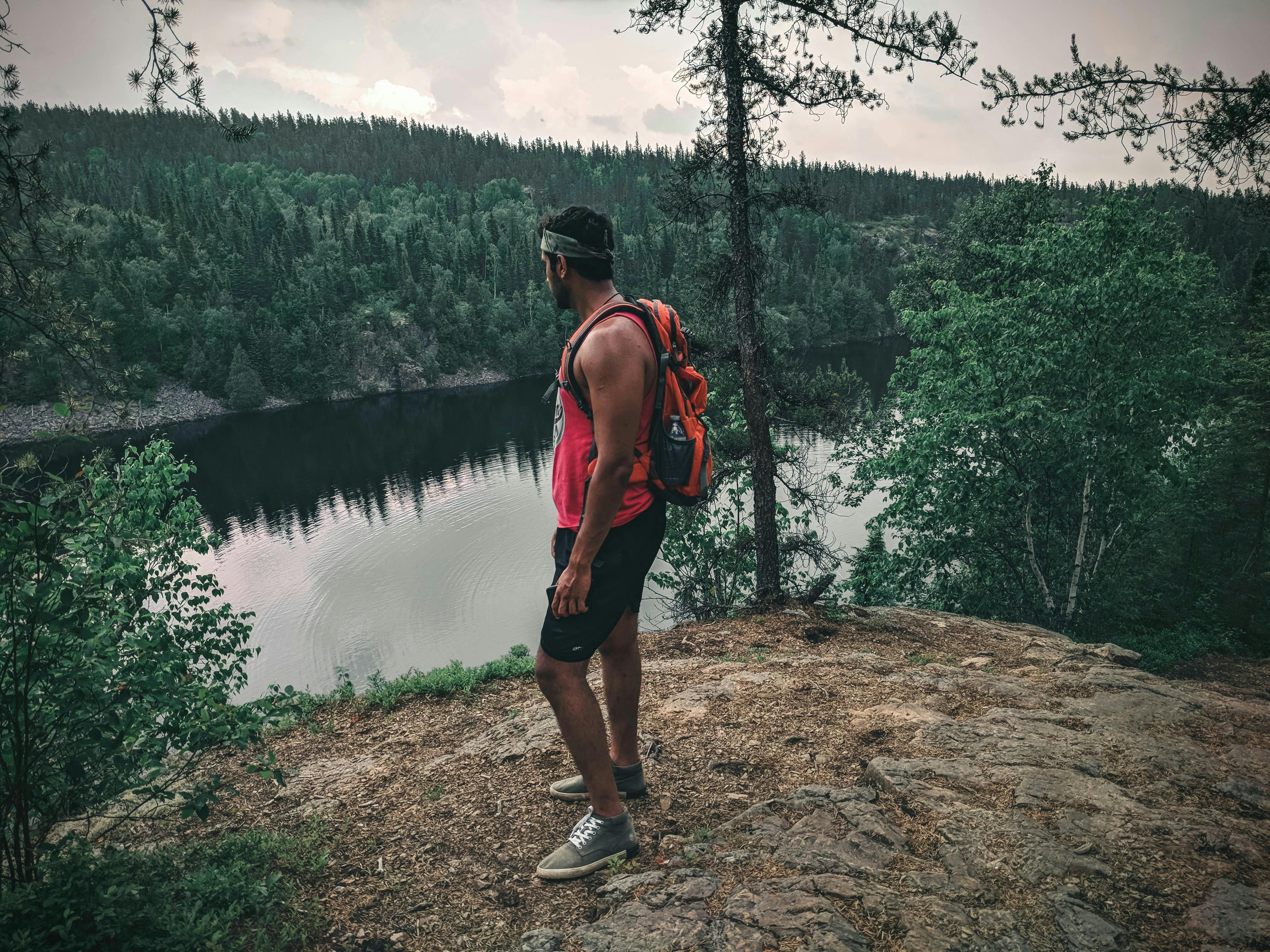 Man Walking On Stone Pathway · Free Stock Photo
