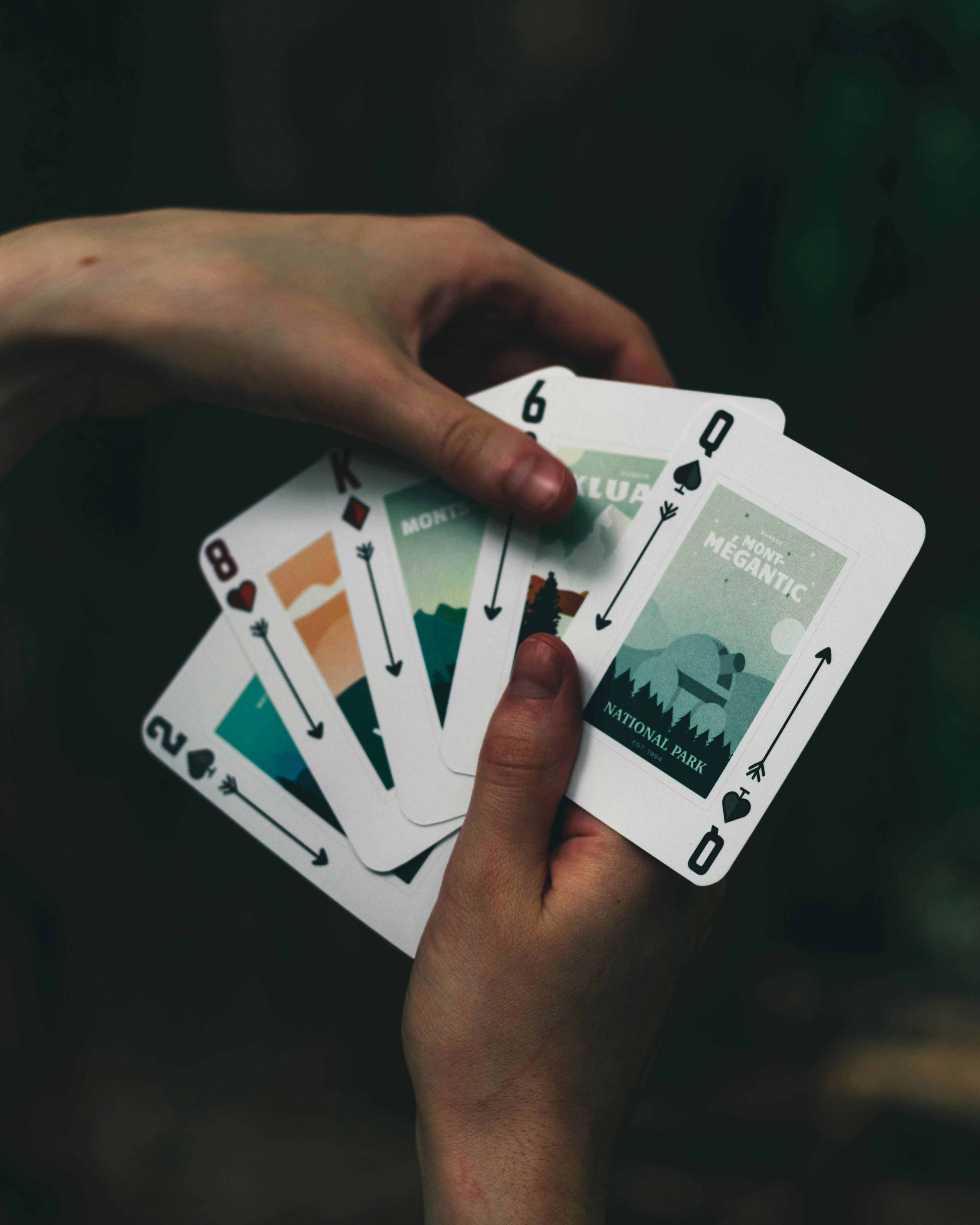 A Person Holding Playing Cards · Free Stock Photo